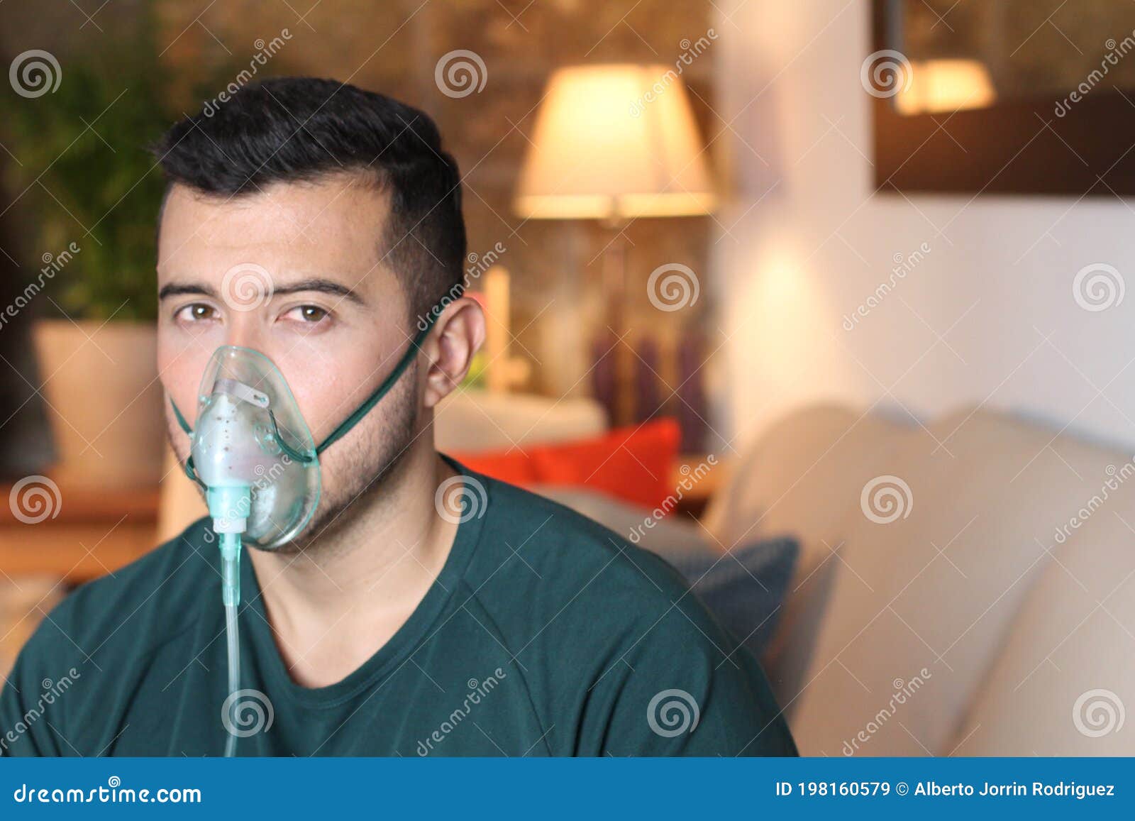 Young Hispanic Man Using Oxygen Mask Stock Image - Image of medical ...