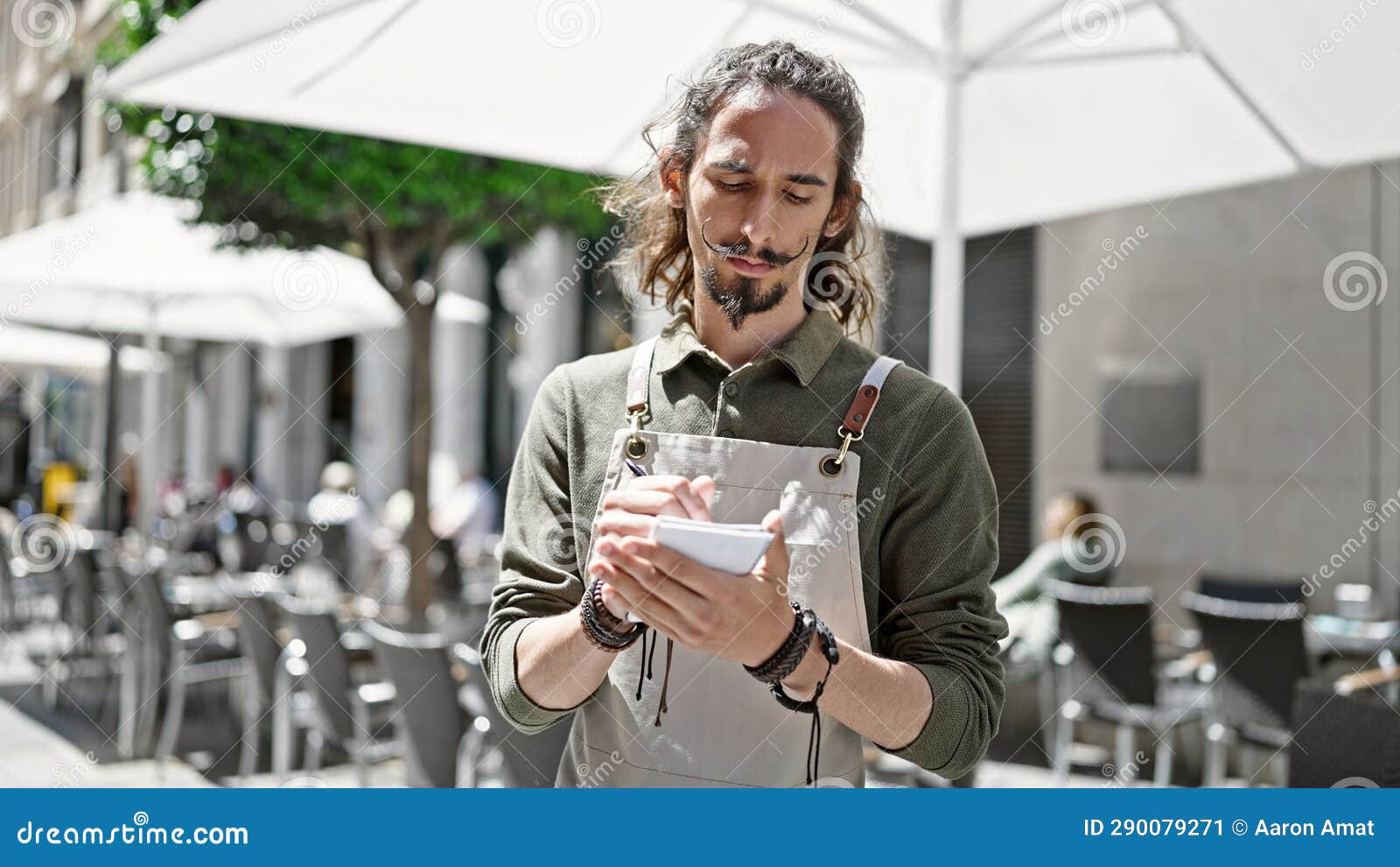 Young Hispanic Man Waiter Taking Notes at Coffee Shop Terrace Stock ...