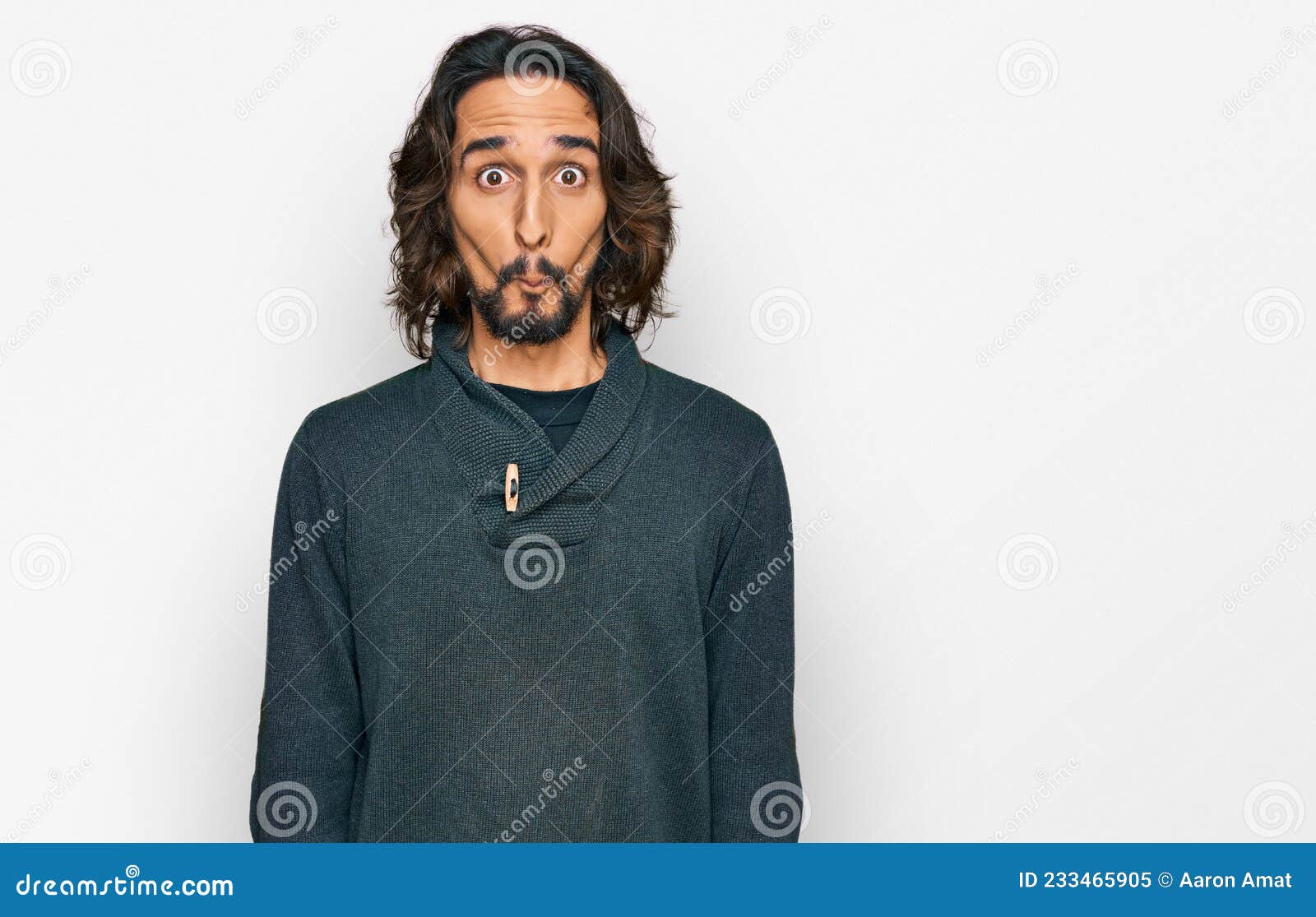 Young Hispanic Man Wearing Casual Clothes Making Fish Face with Lips ...