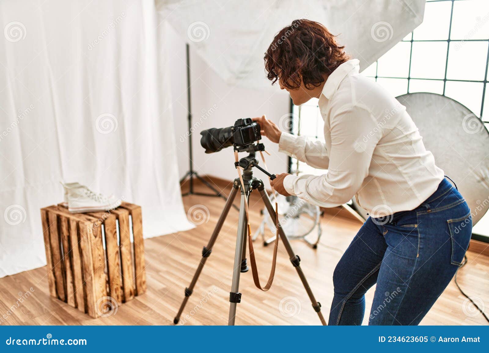 Young Hispanic Photographer Woman on Back View Using Camera at Photo ...