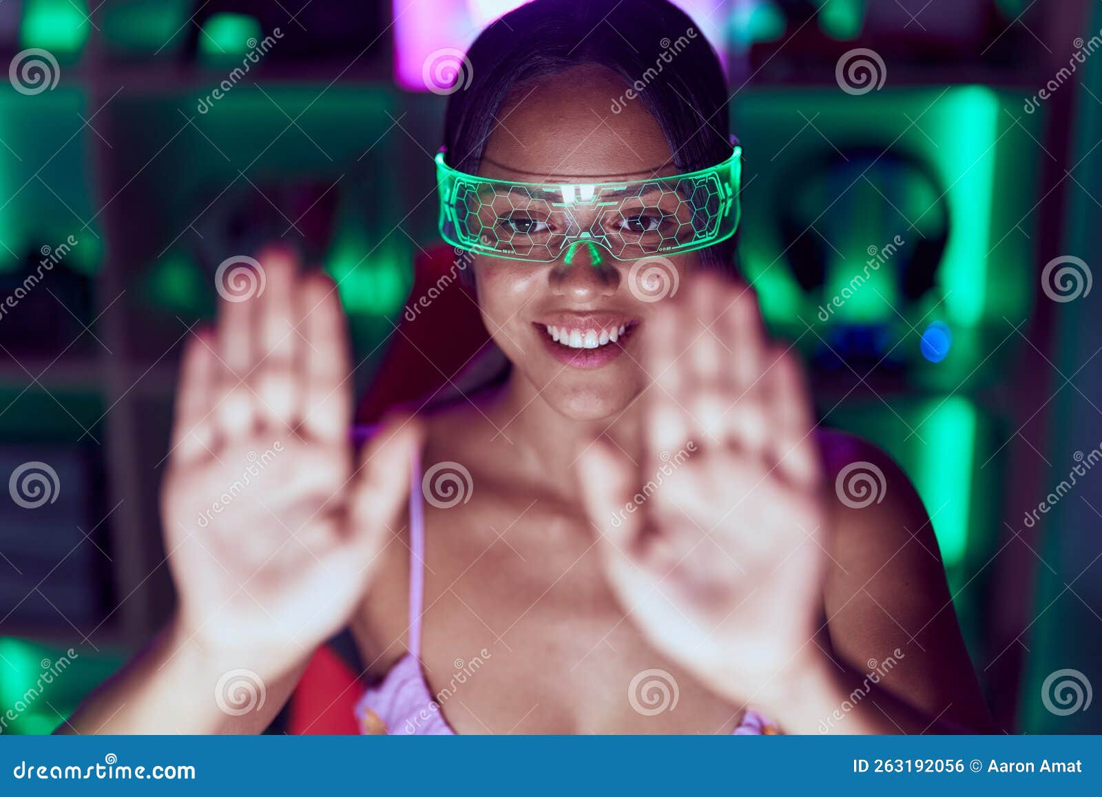 Young Hispanic Woman Streamer Using Virtual Reality Glasses at Gaming ...