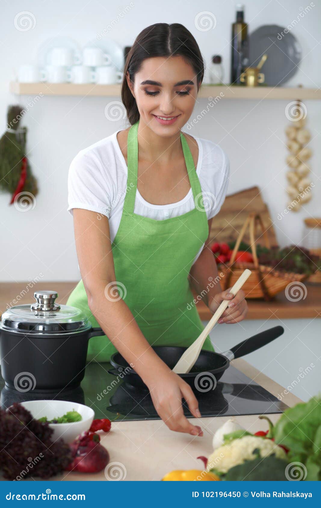 Young Hispanic Woman or Student Cooking in Kitchen Stock Photo - Image ...