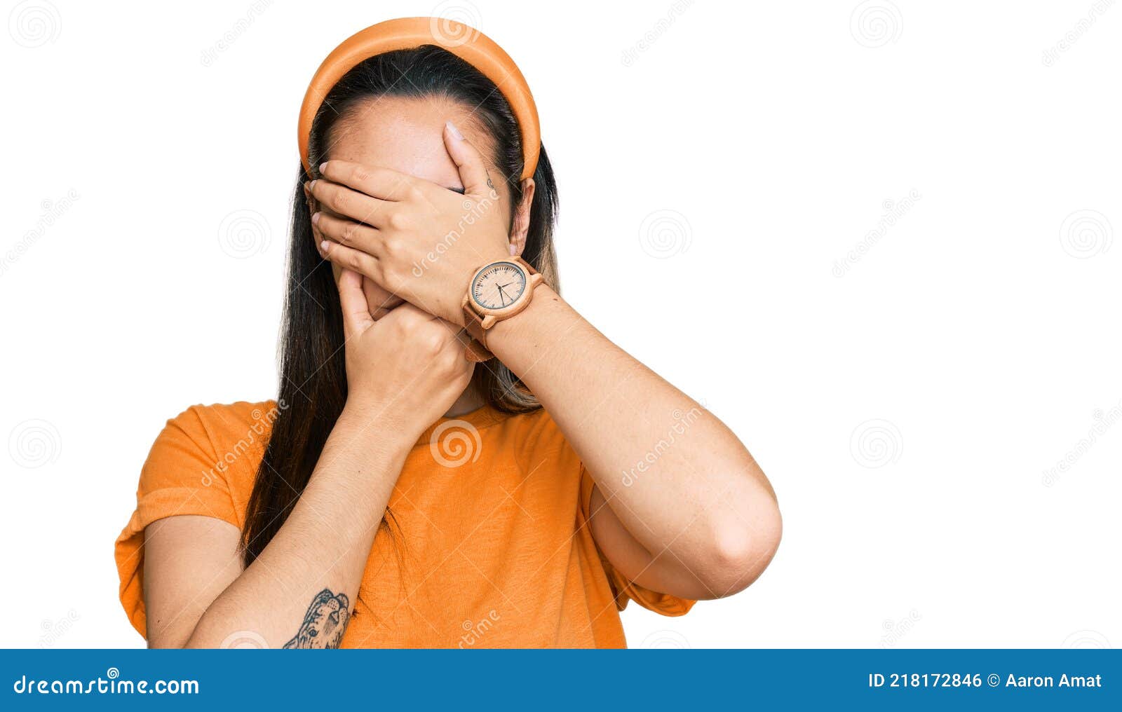Young Hispanic Woman Wearing Casual Clothes Covering Eyes And Mouth