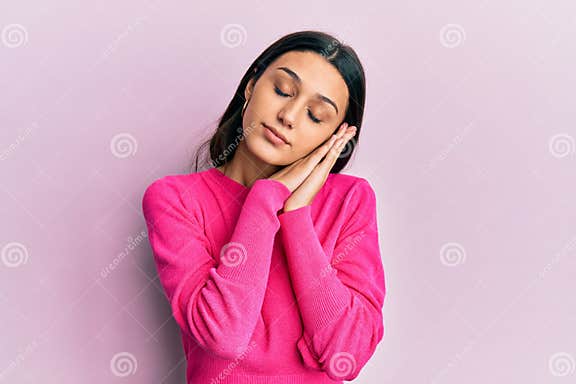Young Hispanic Woman Wearing Casual Clothes Sleeping Tired Dreaming And