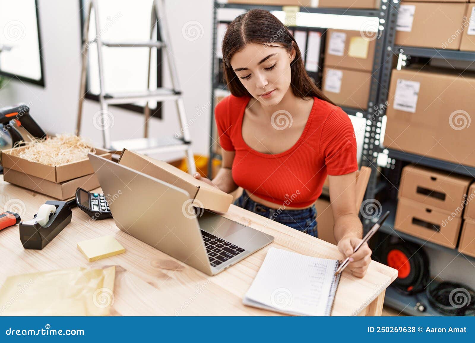 Young Hispanic Woman Working at Warehouse Stock Photo - Image of ...