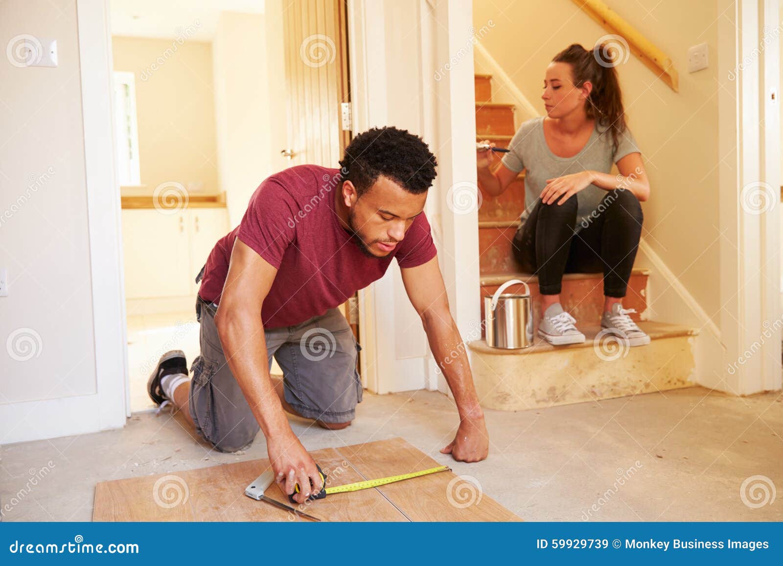 Young Homeowners Decorating Their House Stock Image - Image of length ...