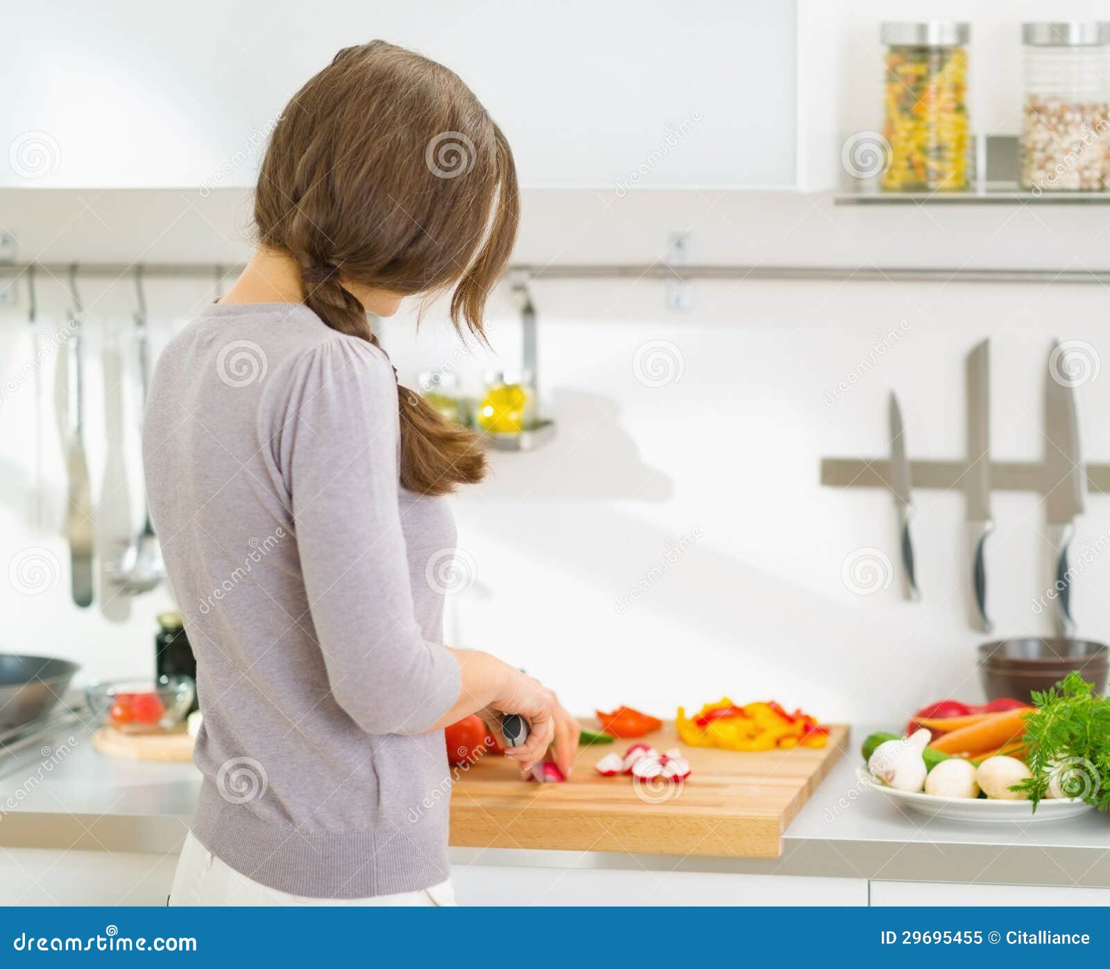 Young Housewife Cutting Vegetables on Salad Stock Image - Image of ...