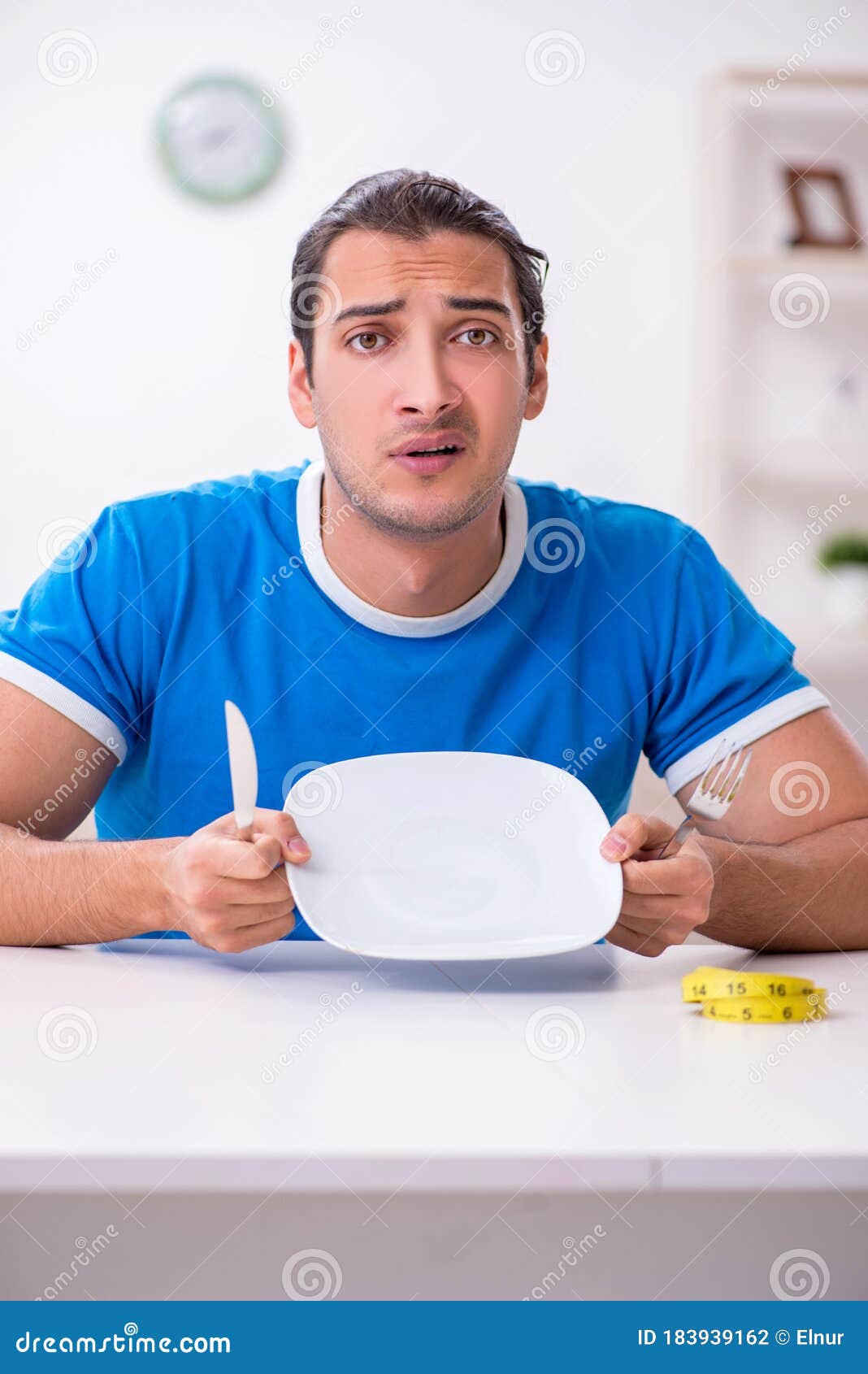 Young Hungry Man in Dieting Concept Stock Photo - Image of healthy ...