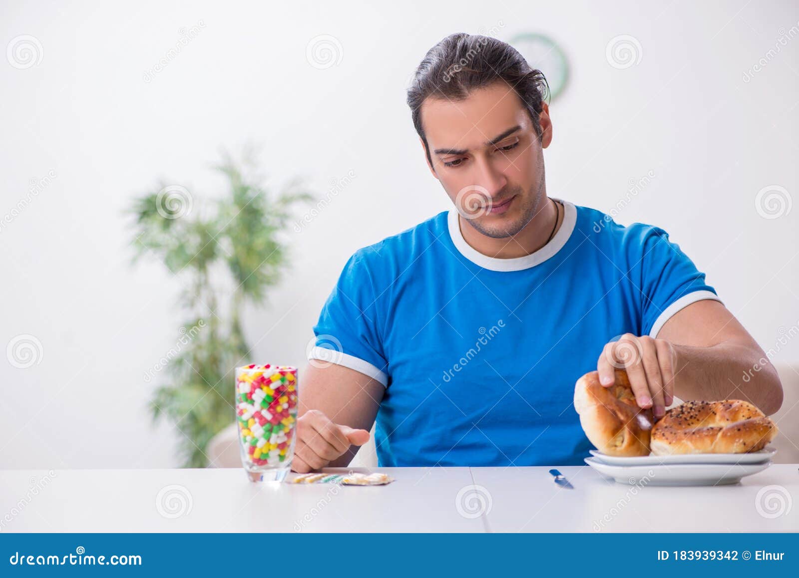 Young Hungry Man in Dieting Concept Stock Photo - Image of hungry ...