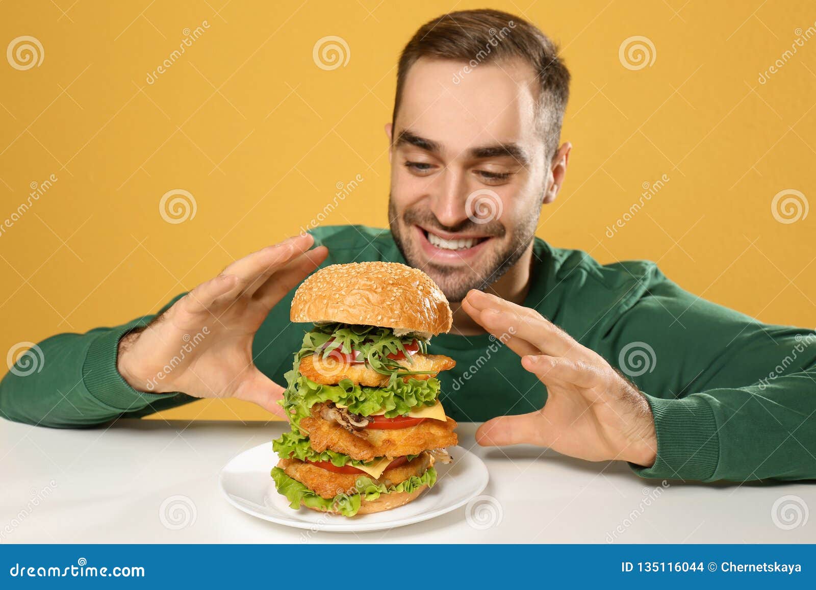 Young Hungry Man Eating Huge Burger Stock Photo - Image of foodstuff ...