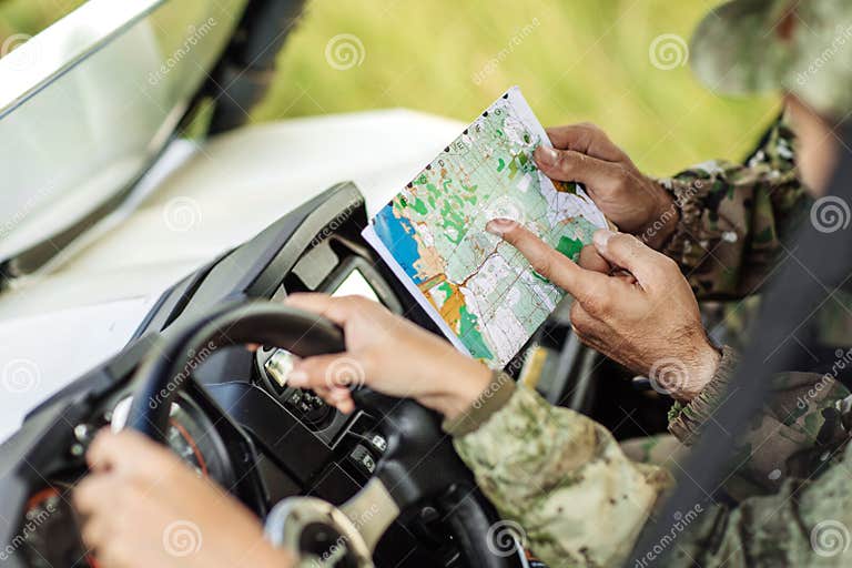 Young Hunters Determine the Route Map and Navigator Stock Image - Image ...