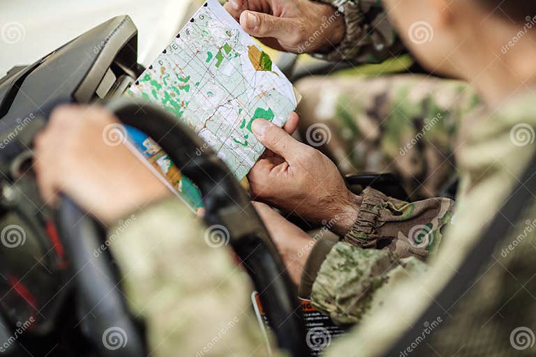 Young Hunters Determine the Route Map and Navigator Stock Photo - Image ...