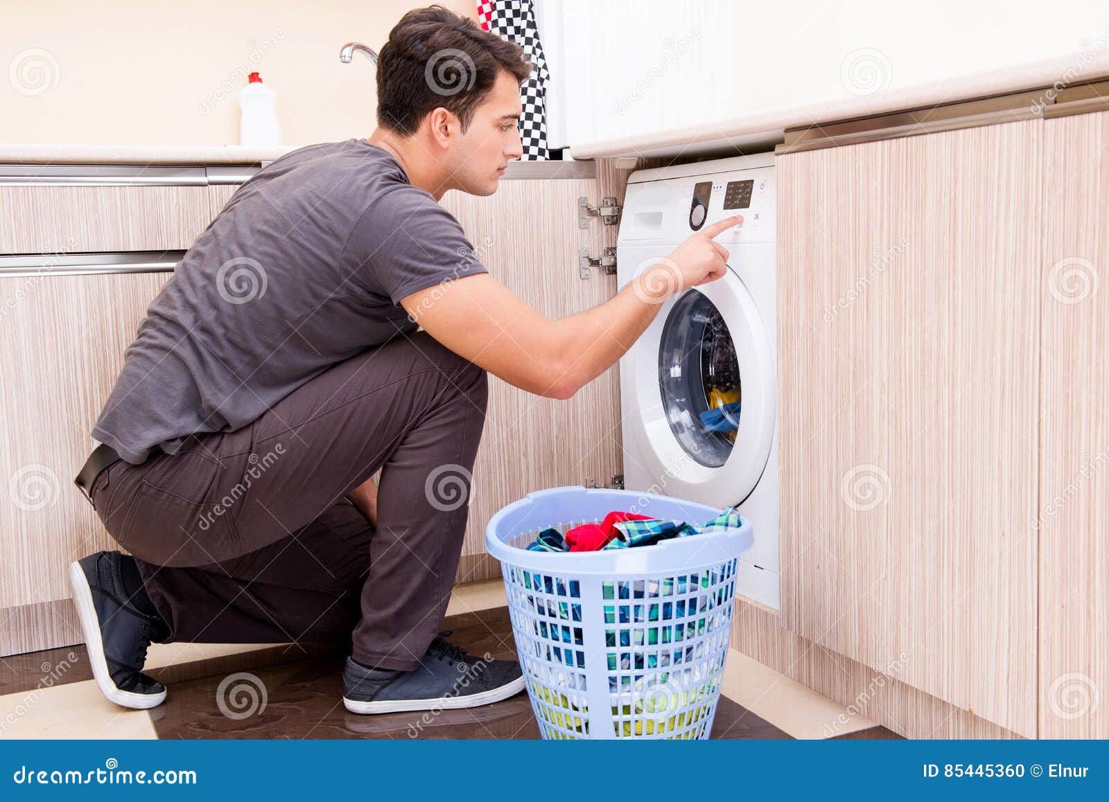 The Young Husband Man Doing Laundry at Home Stock Photo - Image of ...