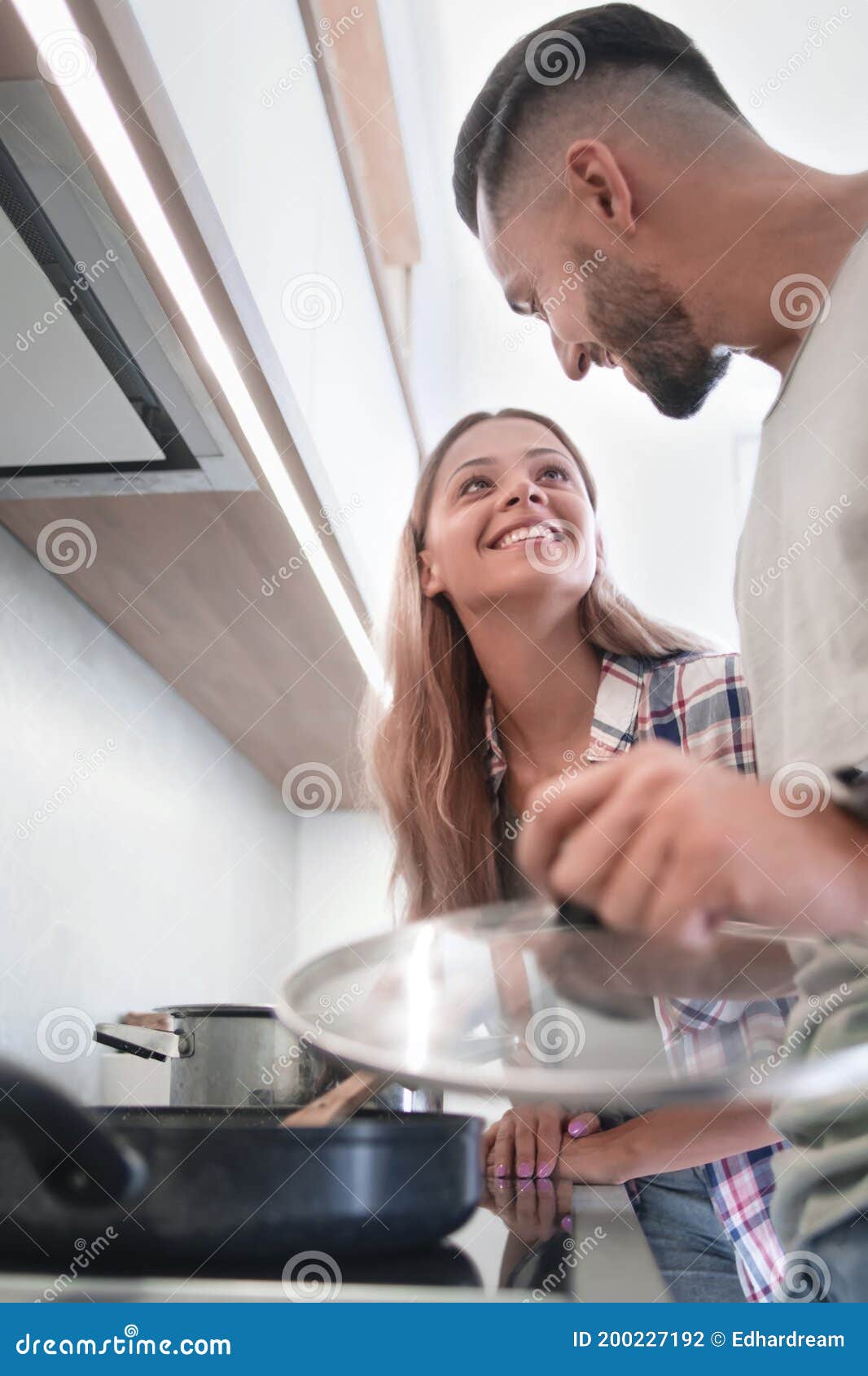 Young Husband and Wife Cook Dinner Together Stock Photo - Image of ...