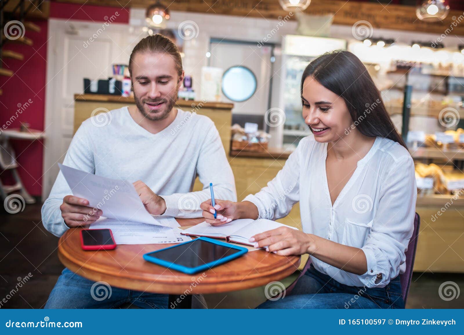 Young Husband and Wife Working on Business Plan Together Stock Image ...