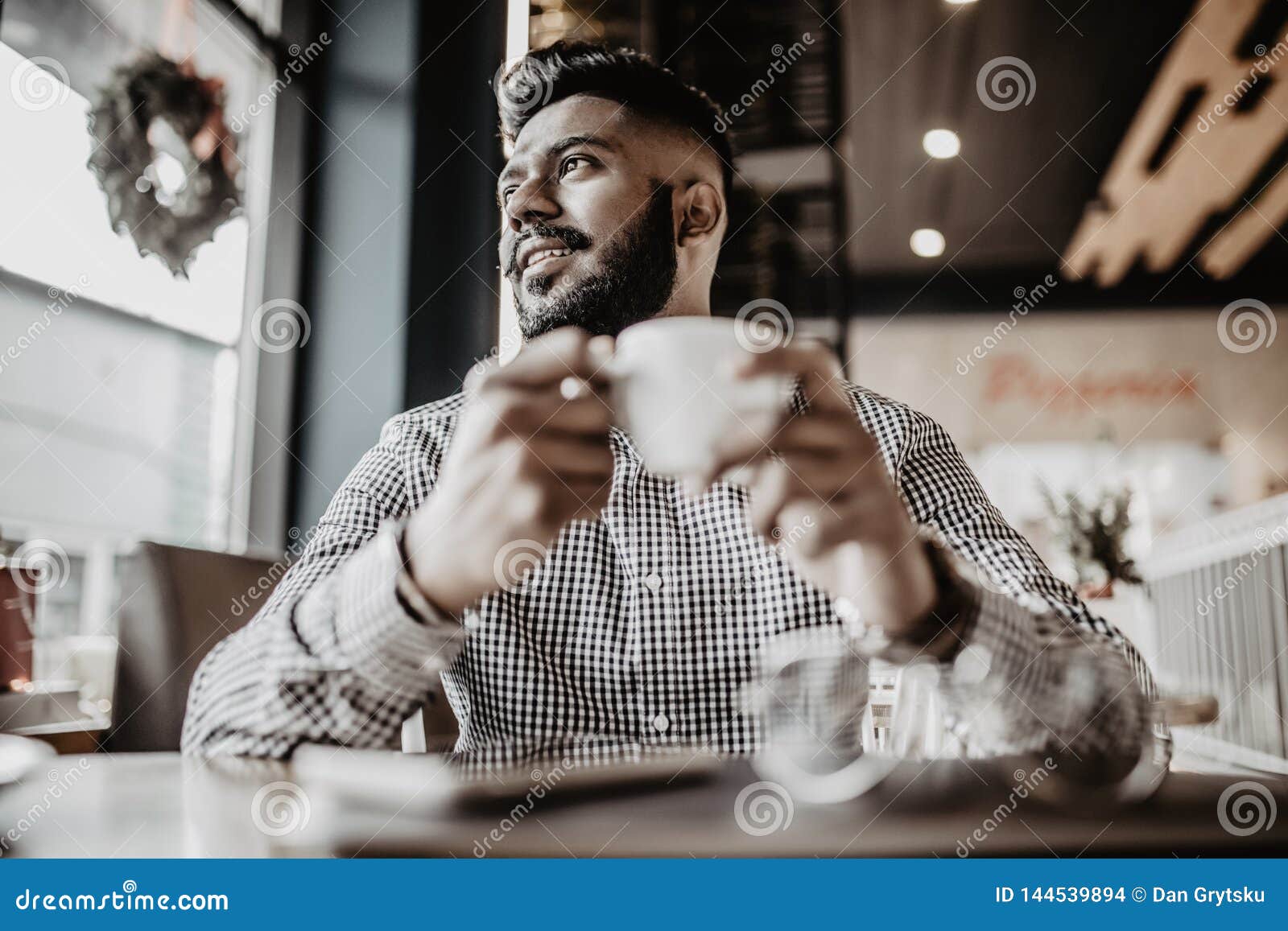 Young Indian Man Drinking Coffee in Cafe Stock Photo - Image of ...