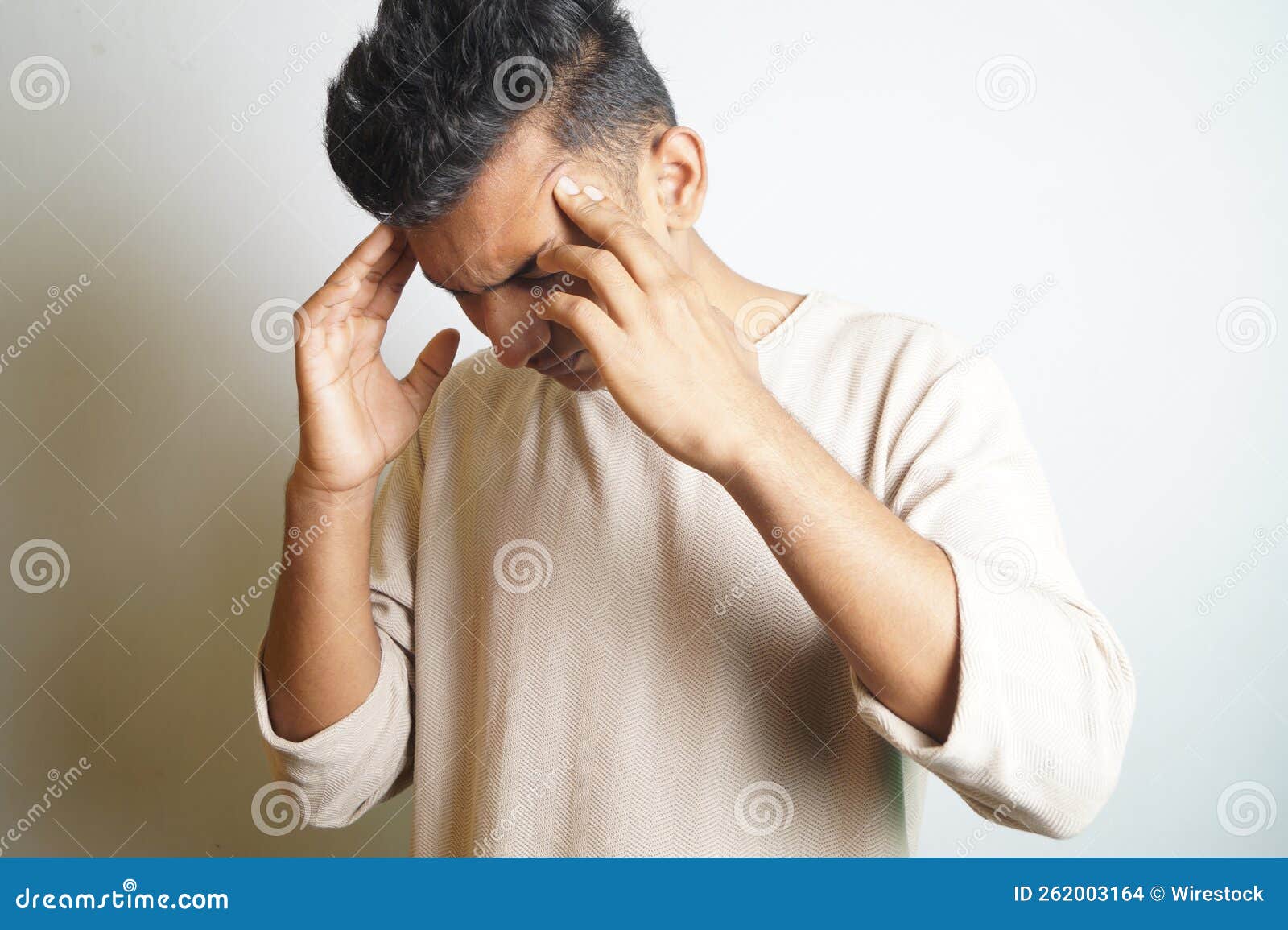 Young Indian Man with a Headache Stock Photo - Image of white, emotions ...