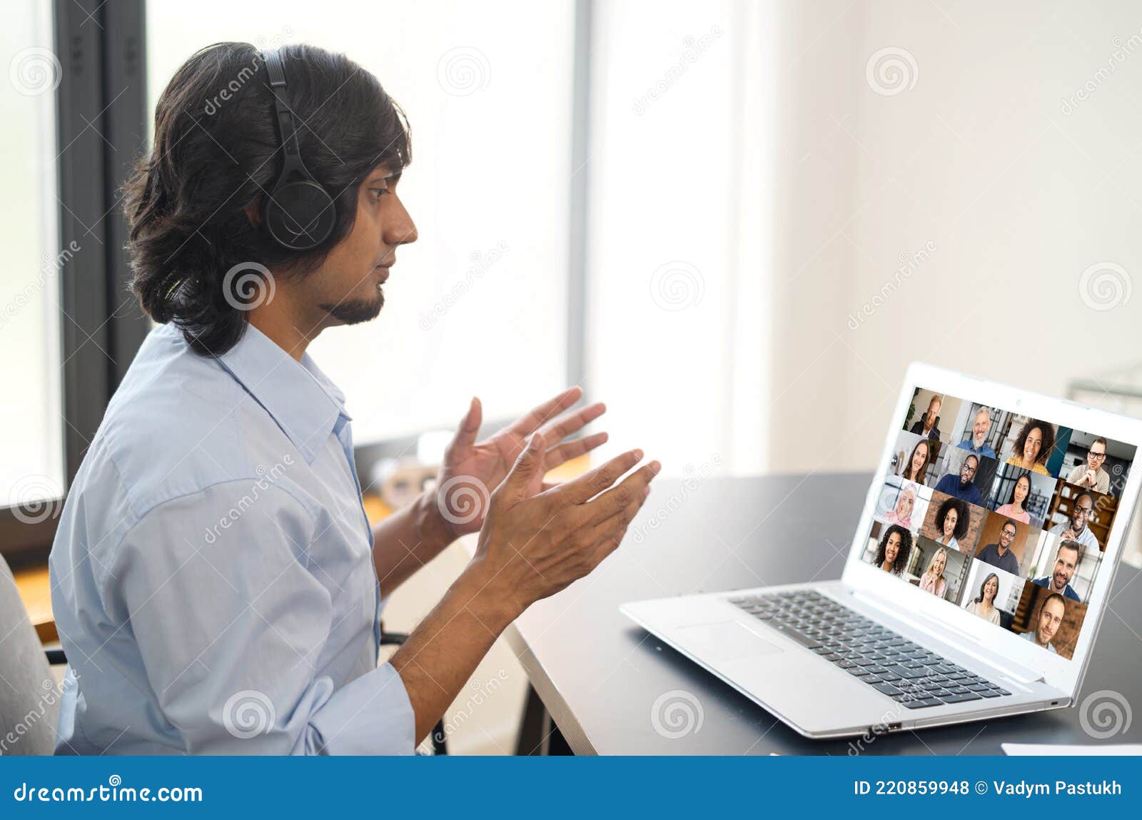Young Indian Man Using Computer App for Video Communication Stock Photo ...