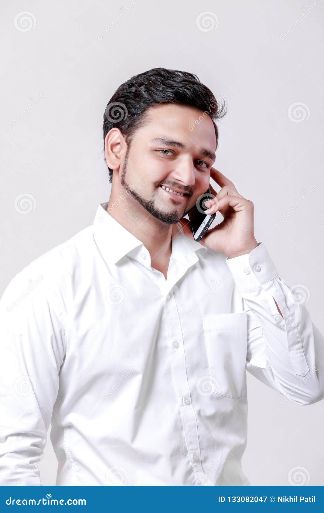 Young Indian Man Using Mobile Stock Image - Image of handsome, middle ...