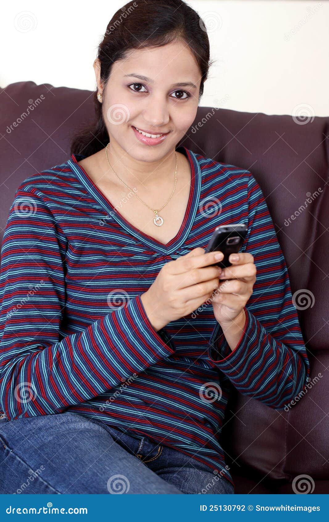 Young Indian woman texting stock photo. Image of stylus - 25130792