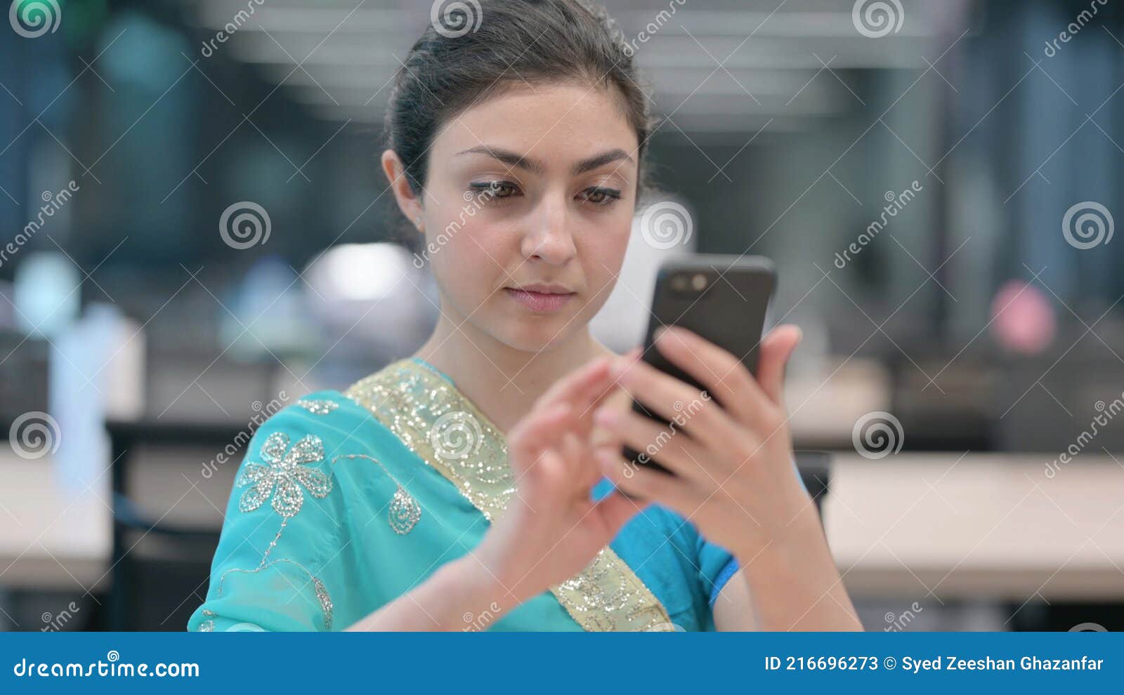 Young Indian Woman Using Smartphone Stock Image - Image of indian, busy ...
