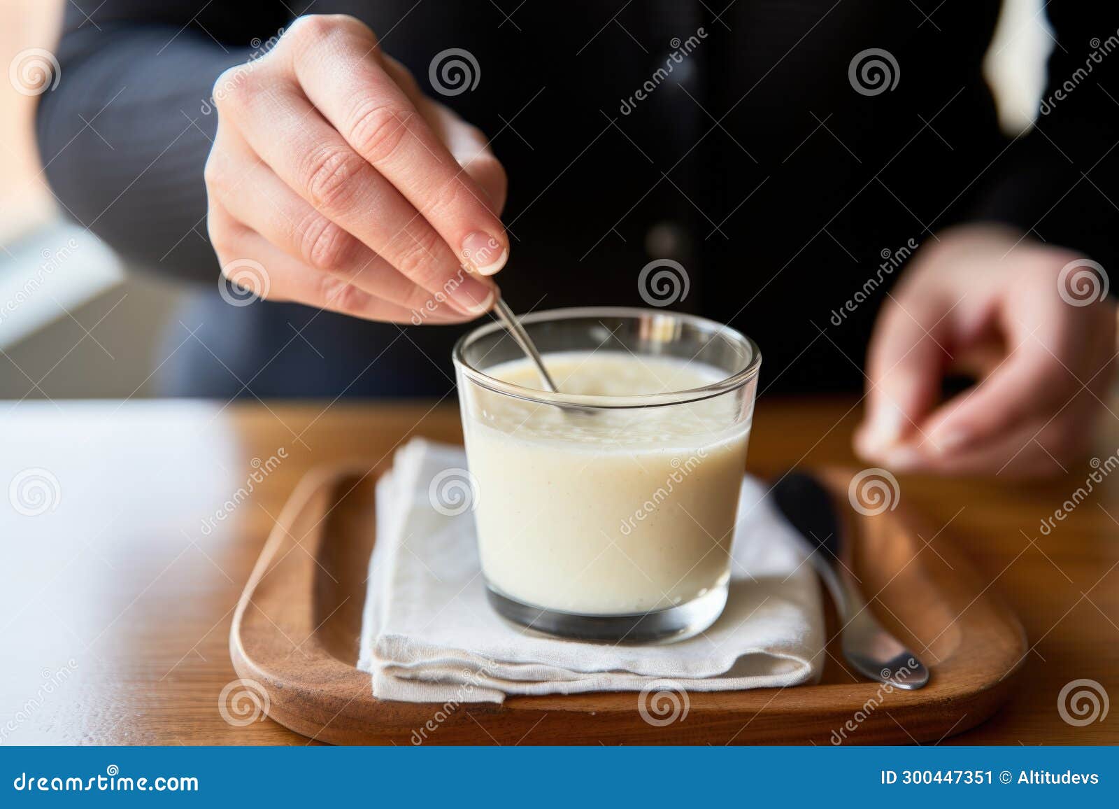 A Young Individual Stirring a Fresh Rice Pudding Drink Stock Image ...