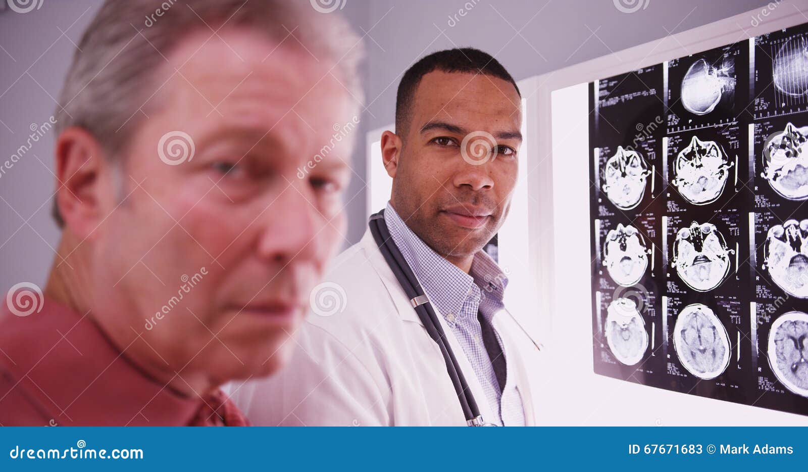 Young Intelligent Doctor Looking at Camera with Mid Aged Patient Stock ...