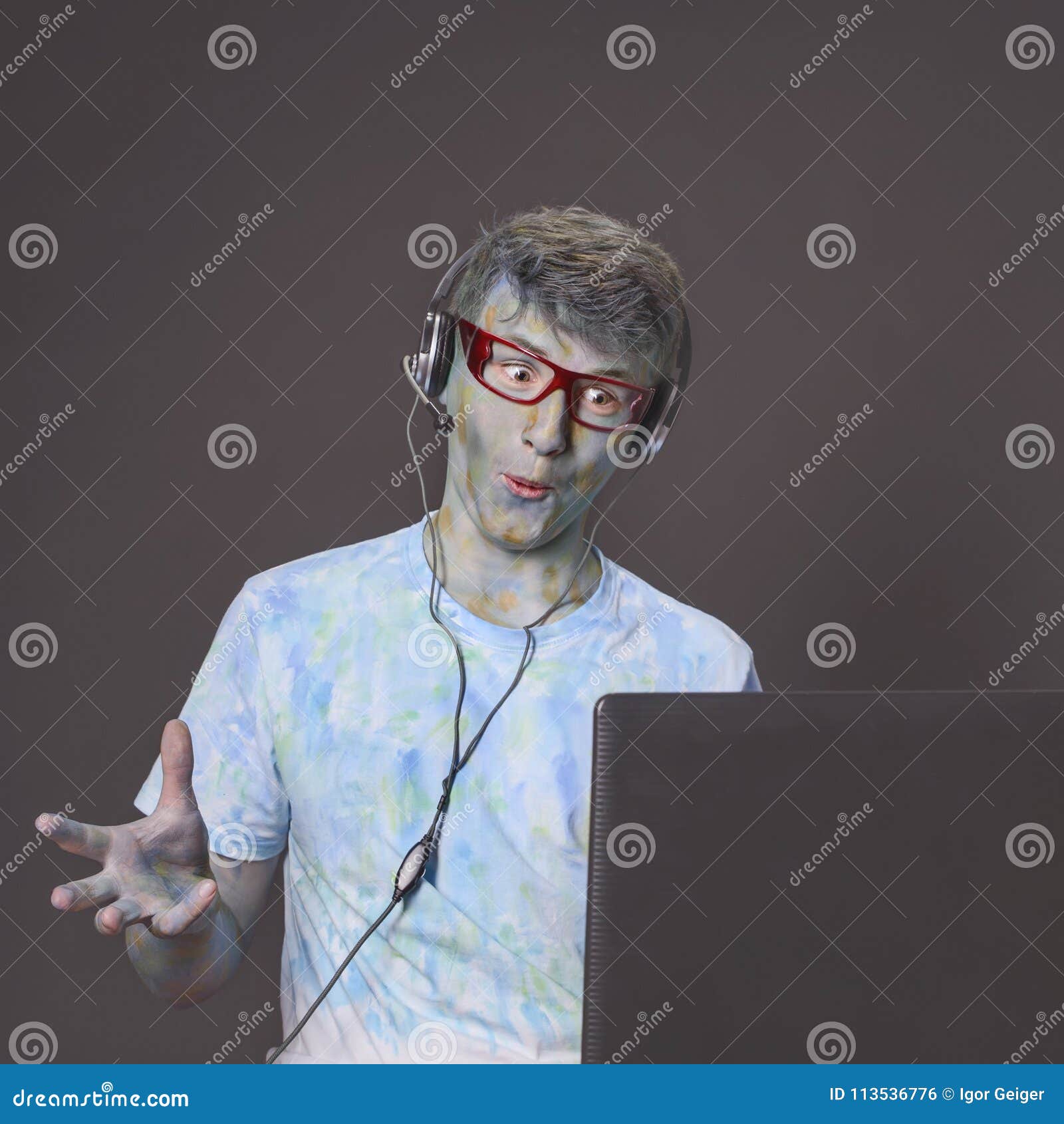 Young and Interesting Guy, Struck with Multicolored Paints in Glasses ...