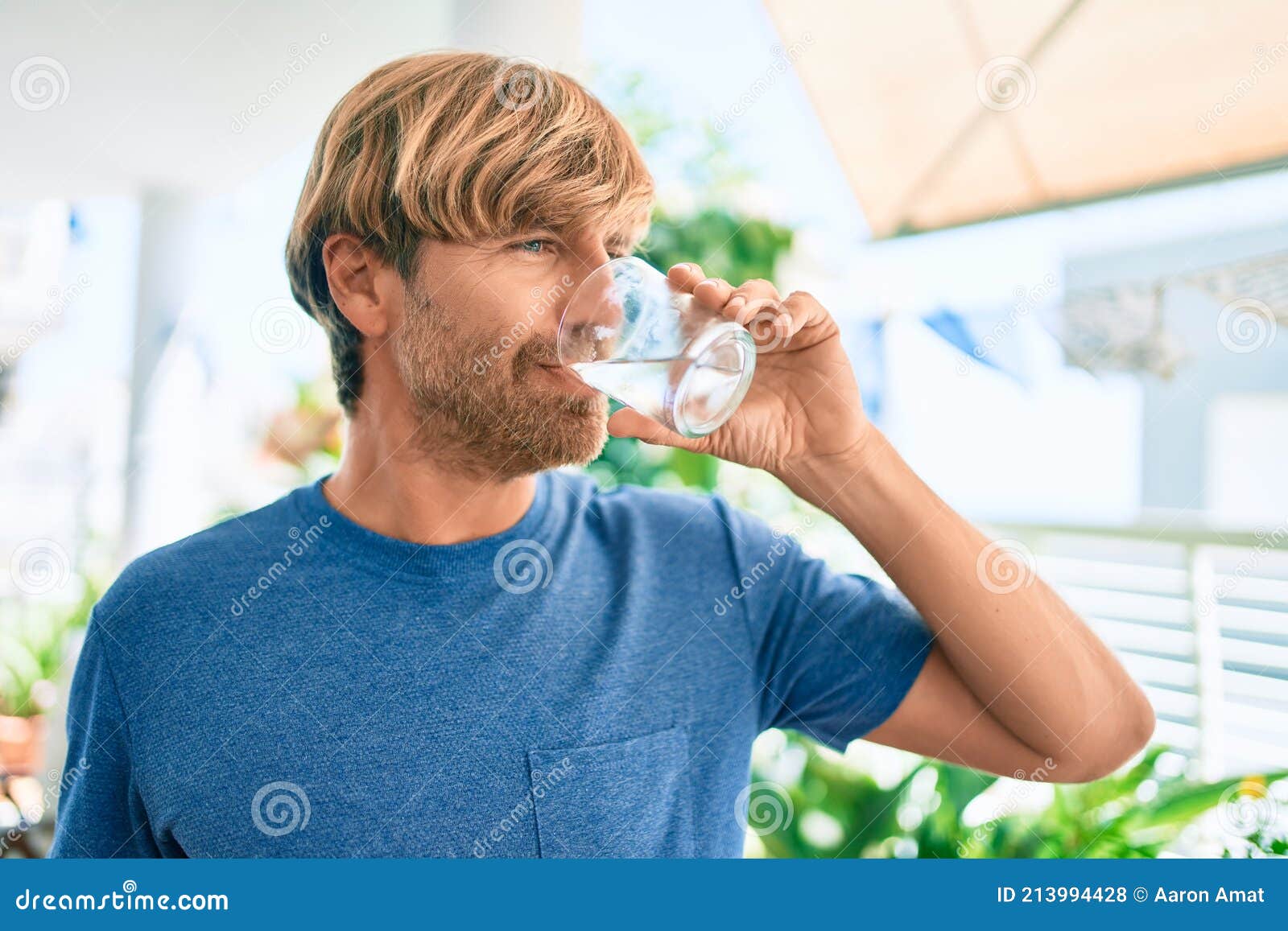 Young Irish Man Drinking Glass of Water at Terrace Stock Photo - Image ...