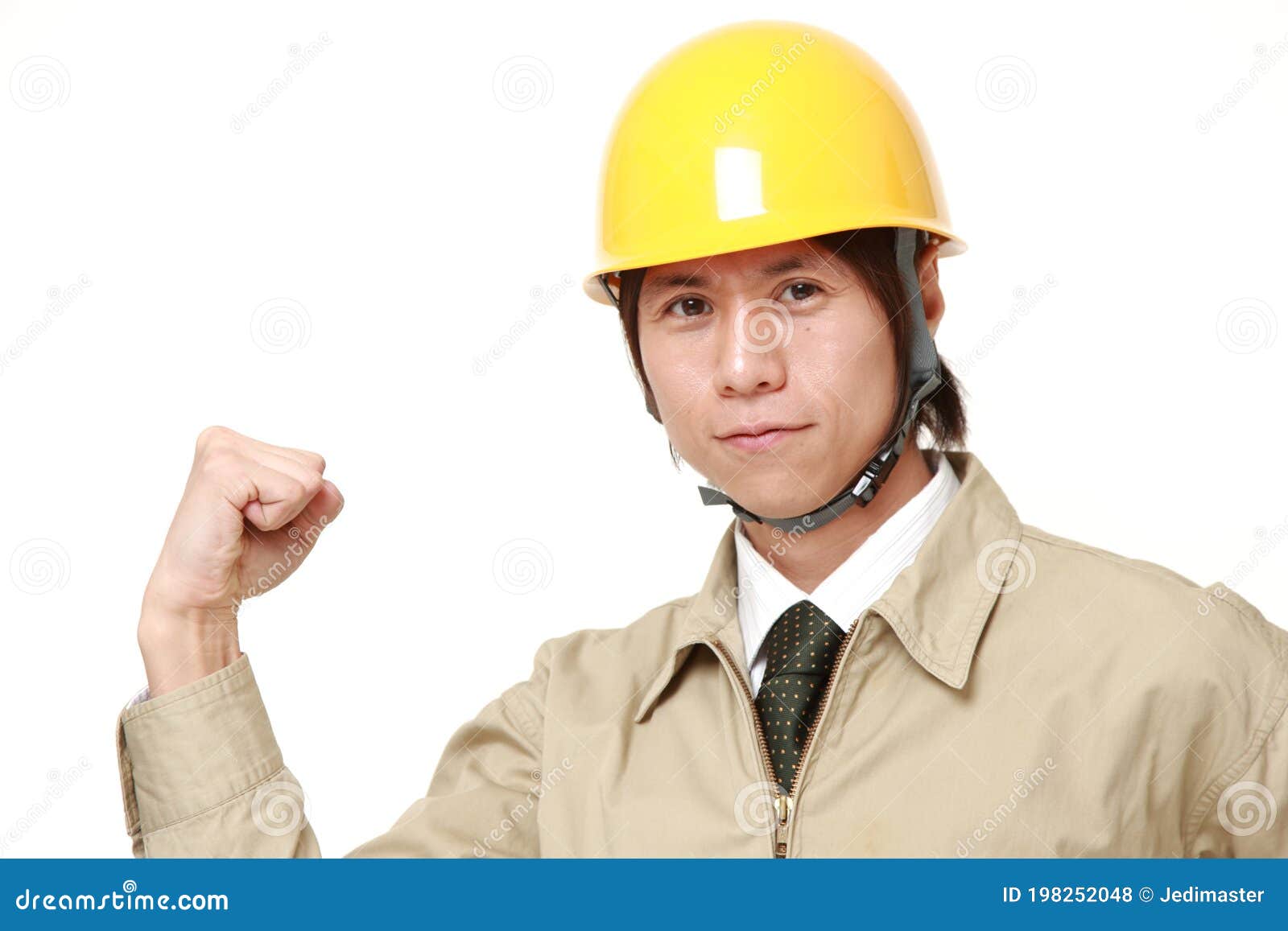 Young Japanese Construction Worker in a Victory Pose Stock Photo ...