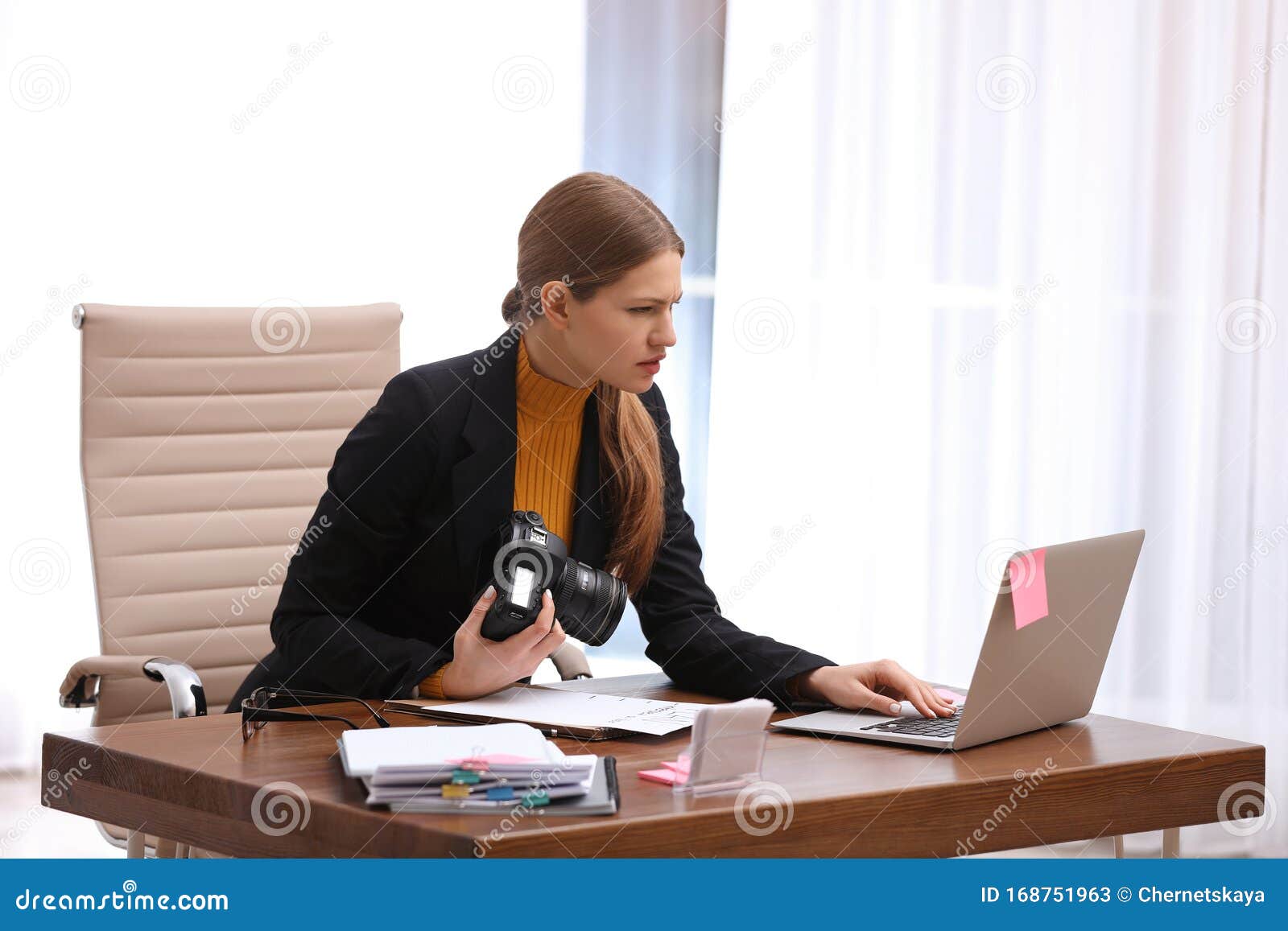 Young Journalist Working at Table Stock Image - Image of camera ...