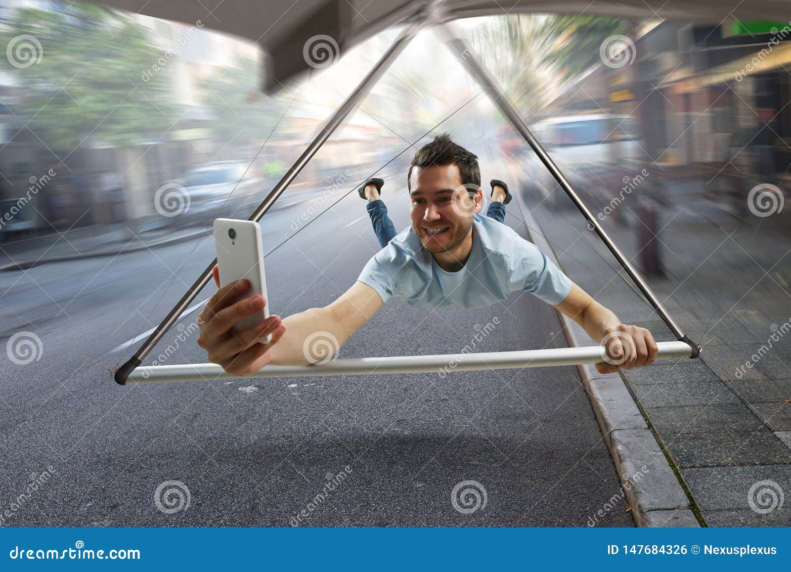 Young Man Flying on Hang Glider. Mixed Media Stock Photo - Image of ...