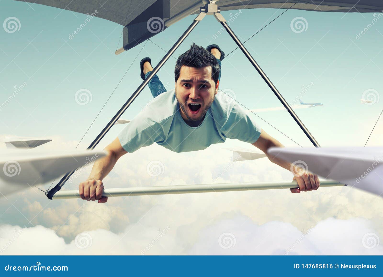 Young Man Flying on Hang Glider. Mixed Media Stock Photo - Image of ...