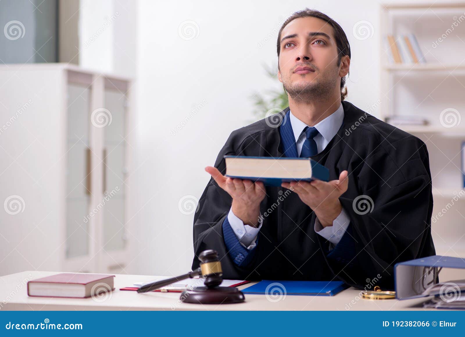 Young Male Judge Working in Courthouse Stock Photo - Image of decision ...