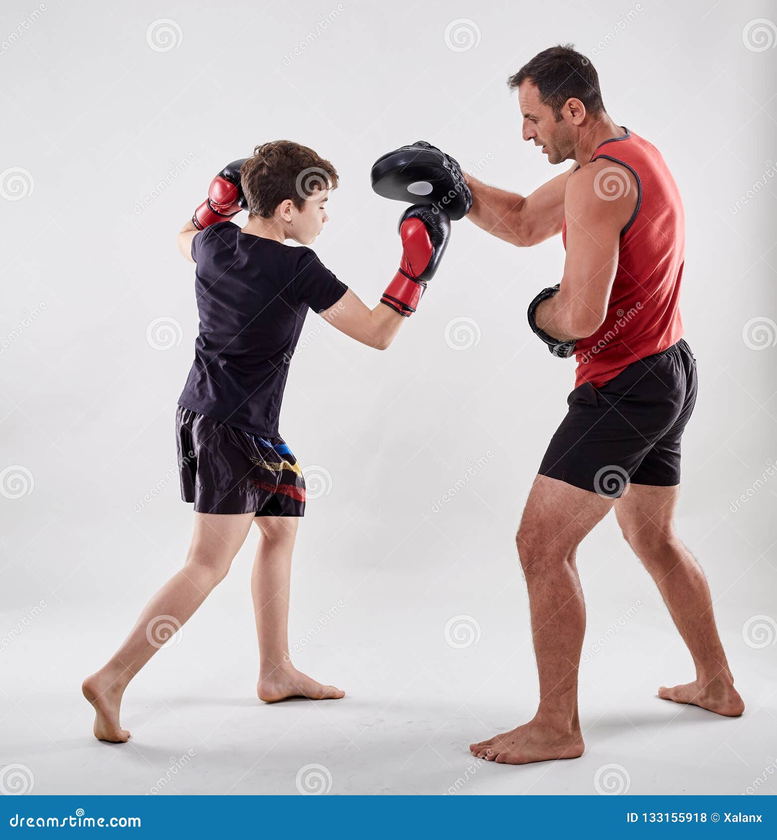 Kickboxer Kid and His Coach Stock Photo - Image of action, gloves ...
