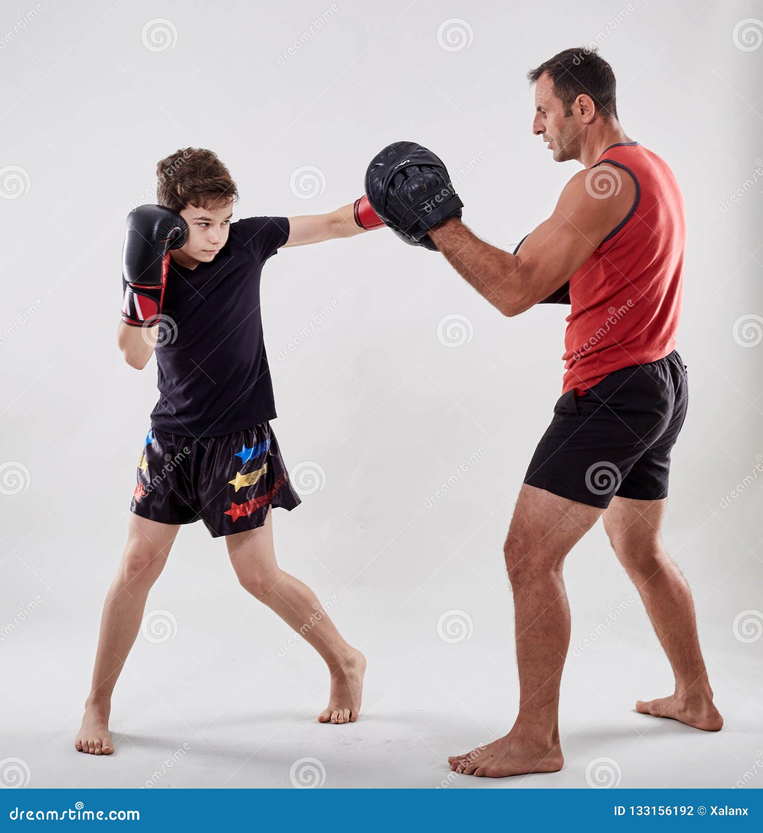 Kickboxer Kid and His Coach Stock Photo - Image of healthy, active ...
