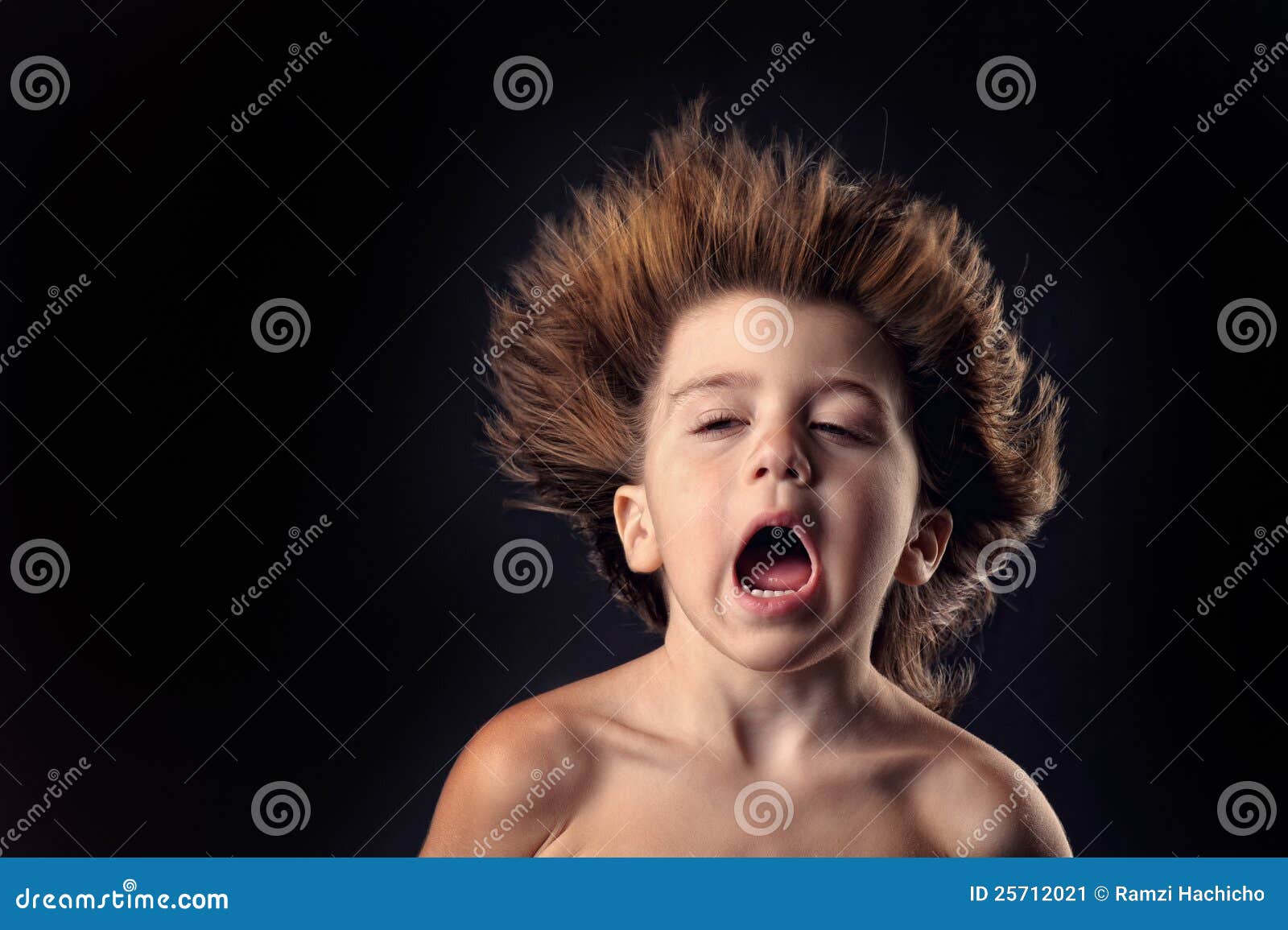 Young Kid with Crazy Expression and Flying Hair Stock Image - Image of ...