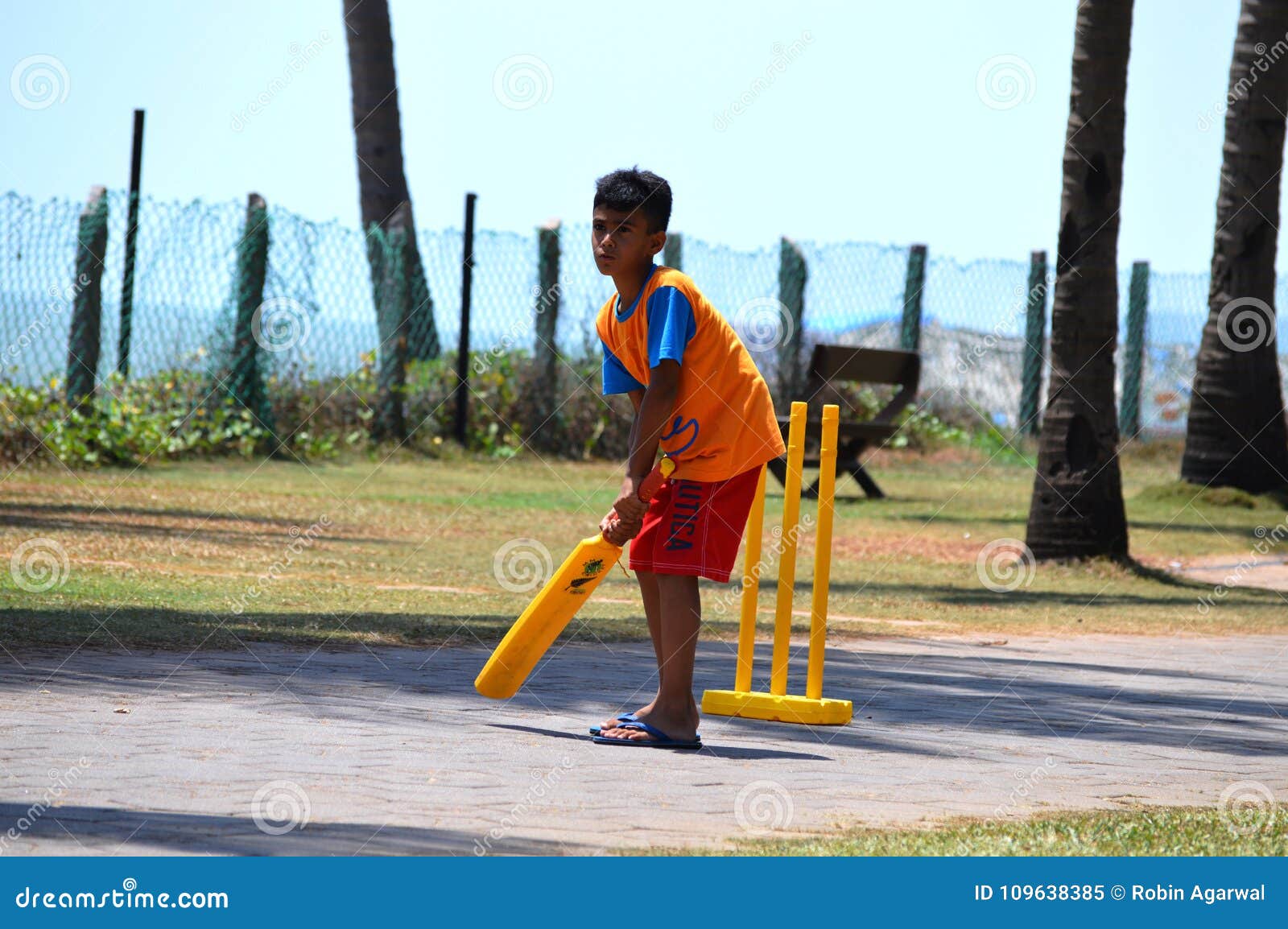 Young Kid Playing Cricket at Street Editorial Image - Image of looking ... Young Kid Playing Cricket at Street Editorial Image - Image of looking ...