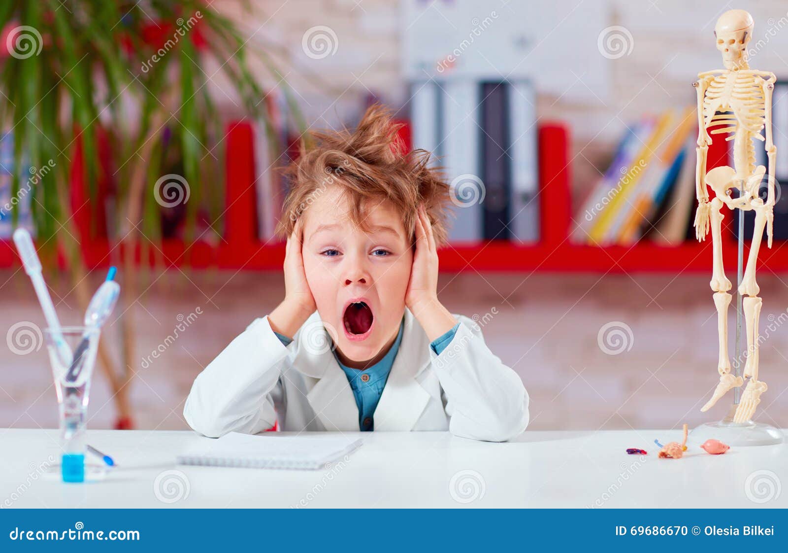 Young Kid, Schoolboy Yawning during Experiment in School Lab Stock ...