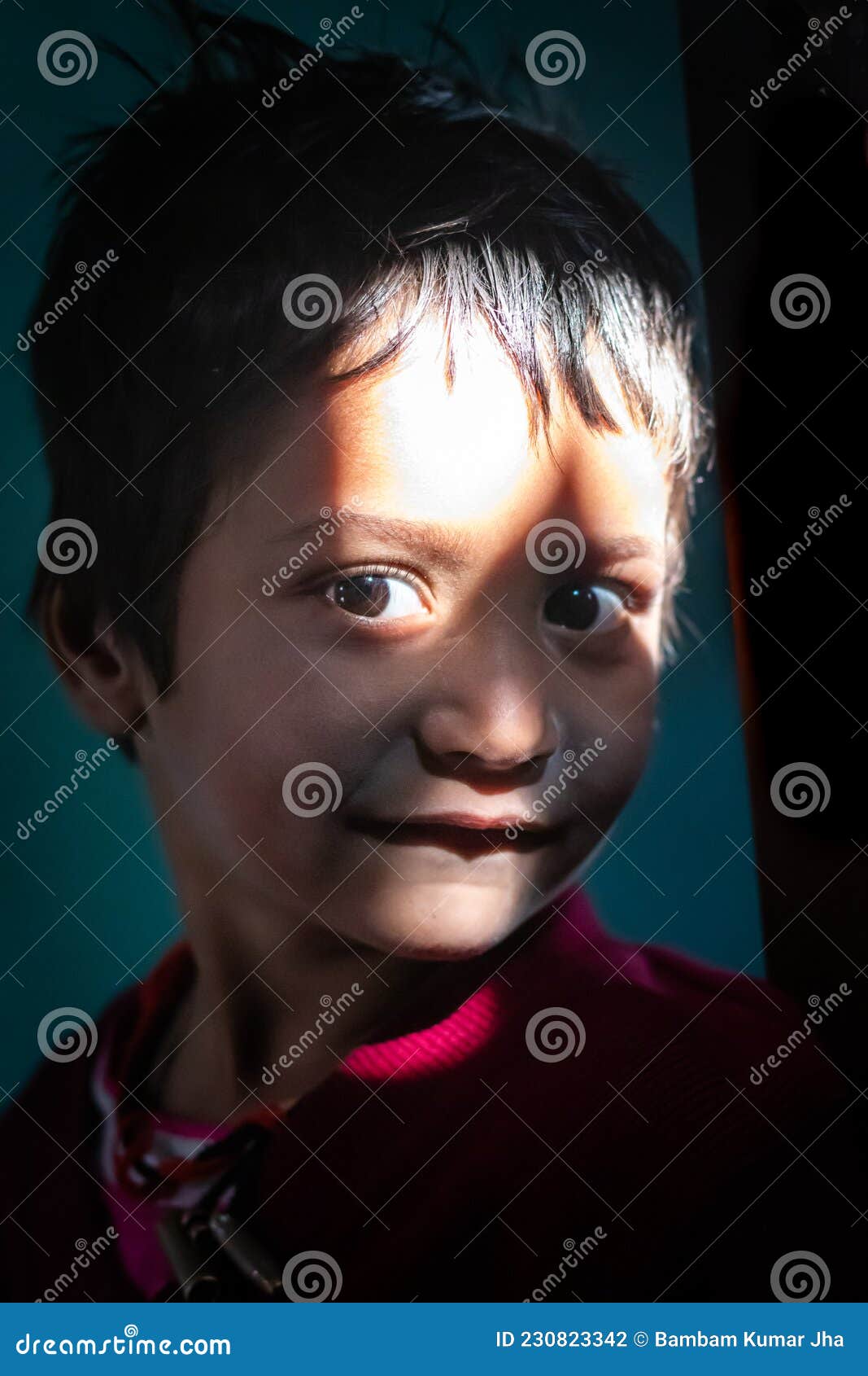Young Kid in Silence with Sunlight on Face Close Up Shot at Day from ...