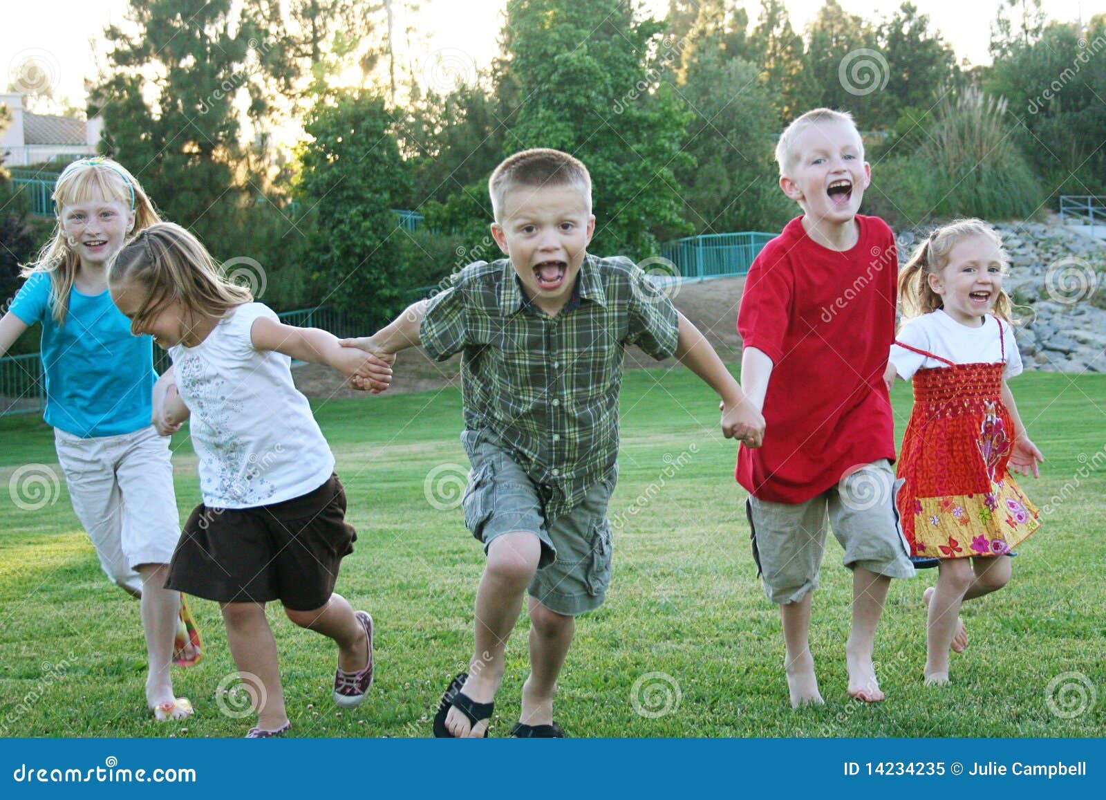 Young kids running outside stock image. Image of playful - 14234235