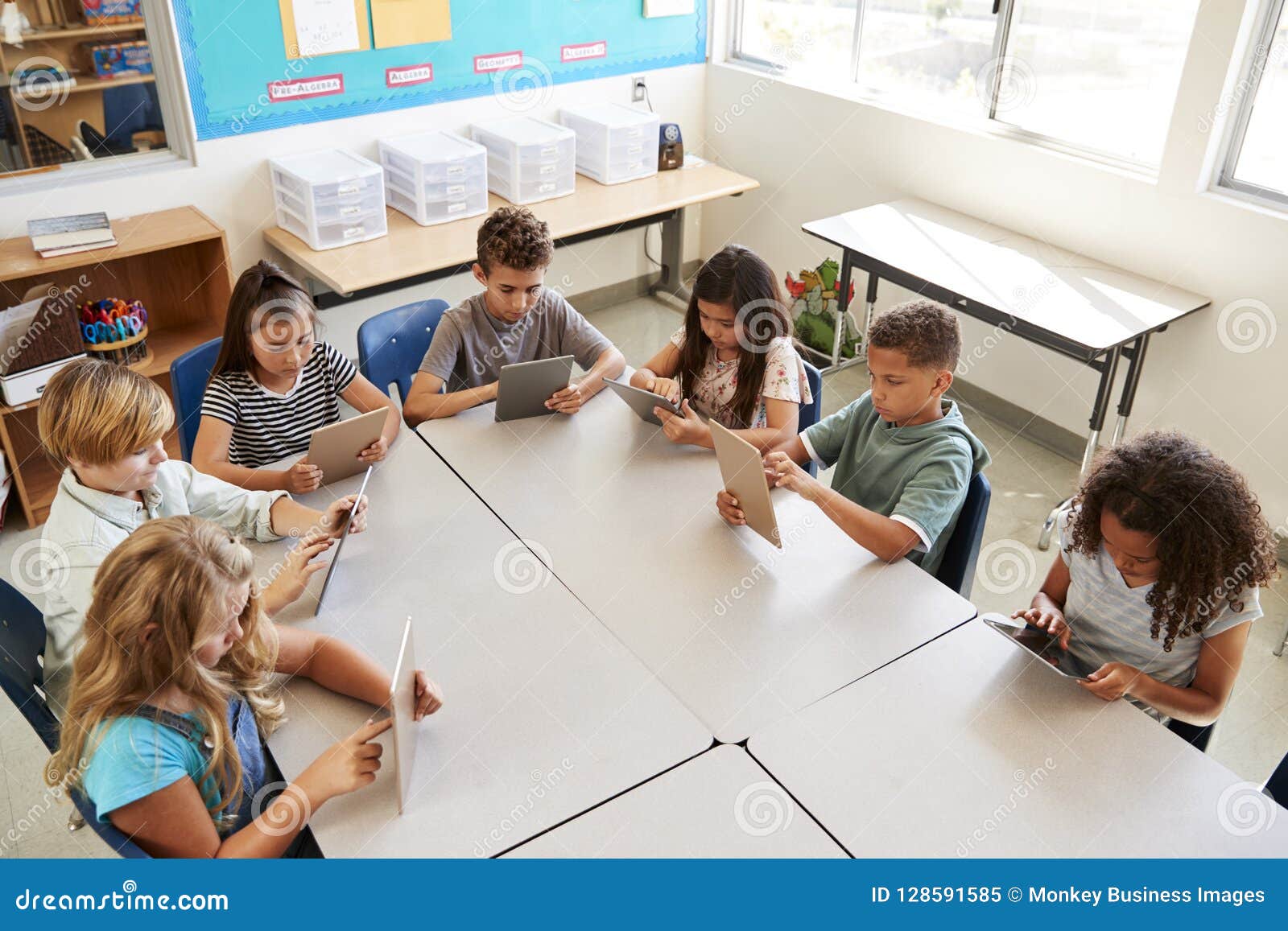 Young Kids Using Tablets in School Lesson, Elevated View Stock Image ...