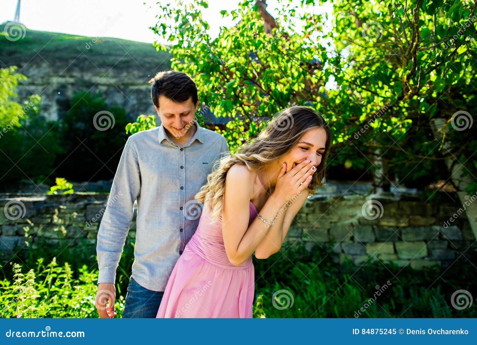 Young Kissing Couple Under Big Tree with Swing Stock Image - Image of ...