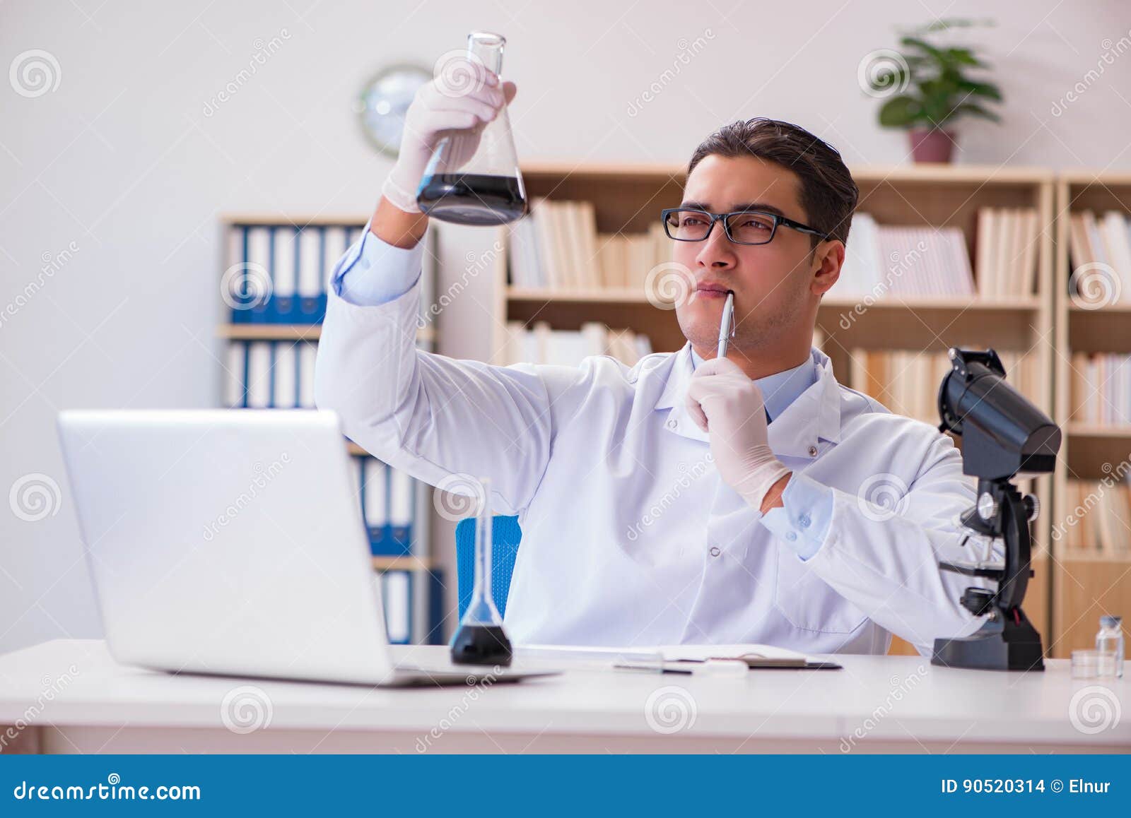 The Young Lab Assistan Working in the Laboratory Stock Photo - Image of ...