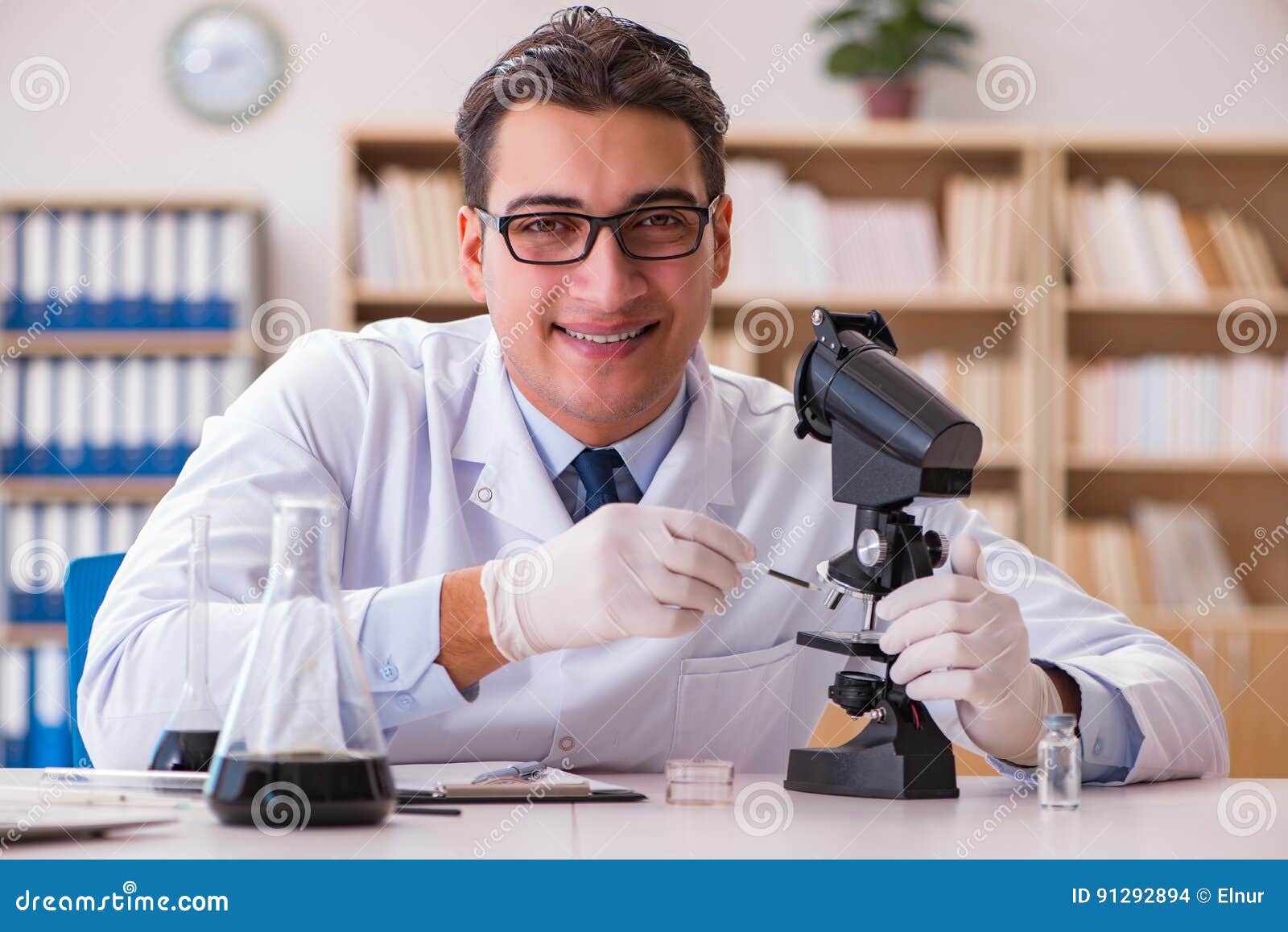 The Young Lab Assistan Working in the Laboratory Stock Photo - Image of ...