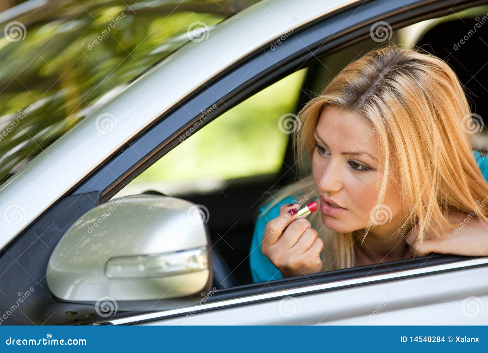 Young Lady Applying Makeup in Car Stock Photo - Image of lipstick ...