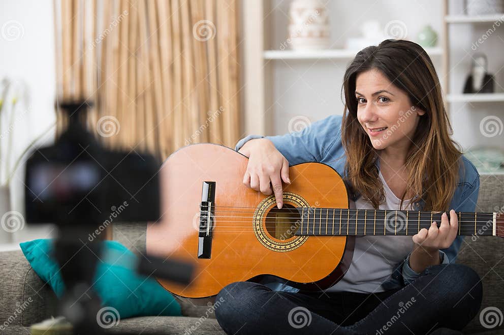 Young Lady Filming Guitar Tutorial Stock Image - Image of vlogger ...