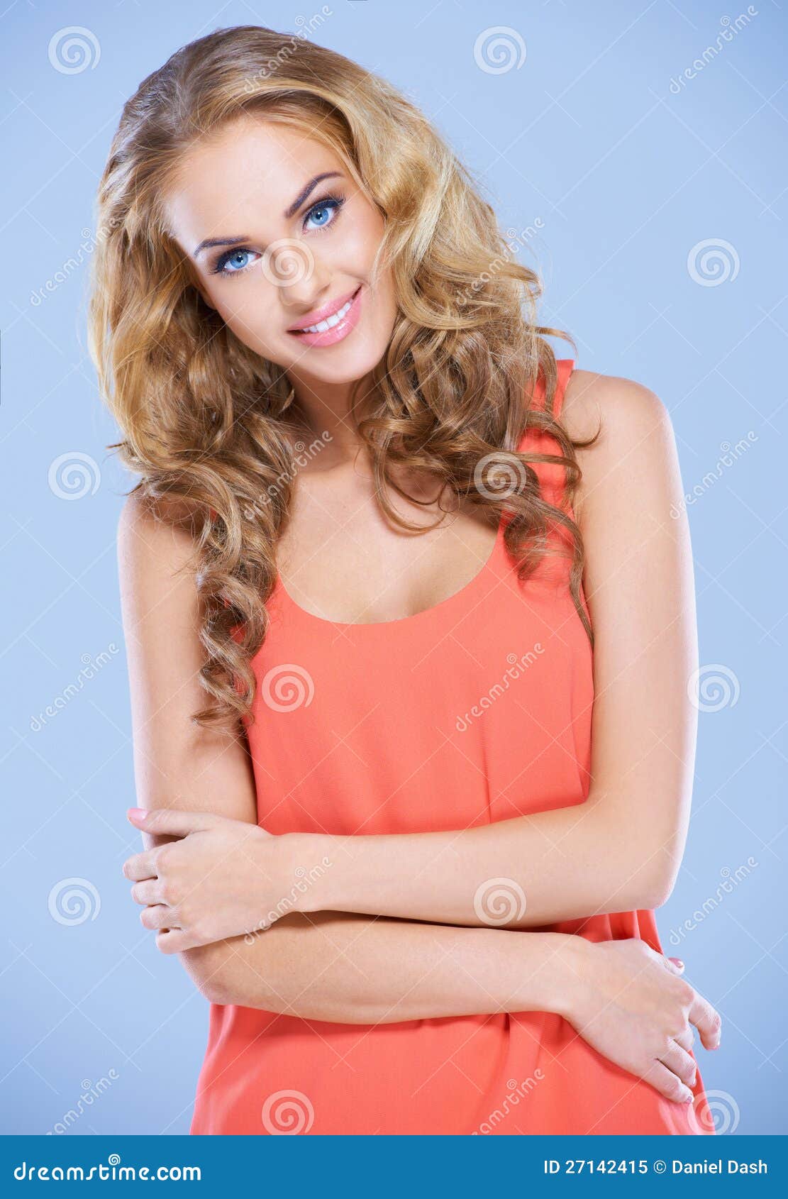 Young Lady with Folded Arms Smiling at the Camera Stock Image - Image ...