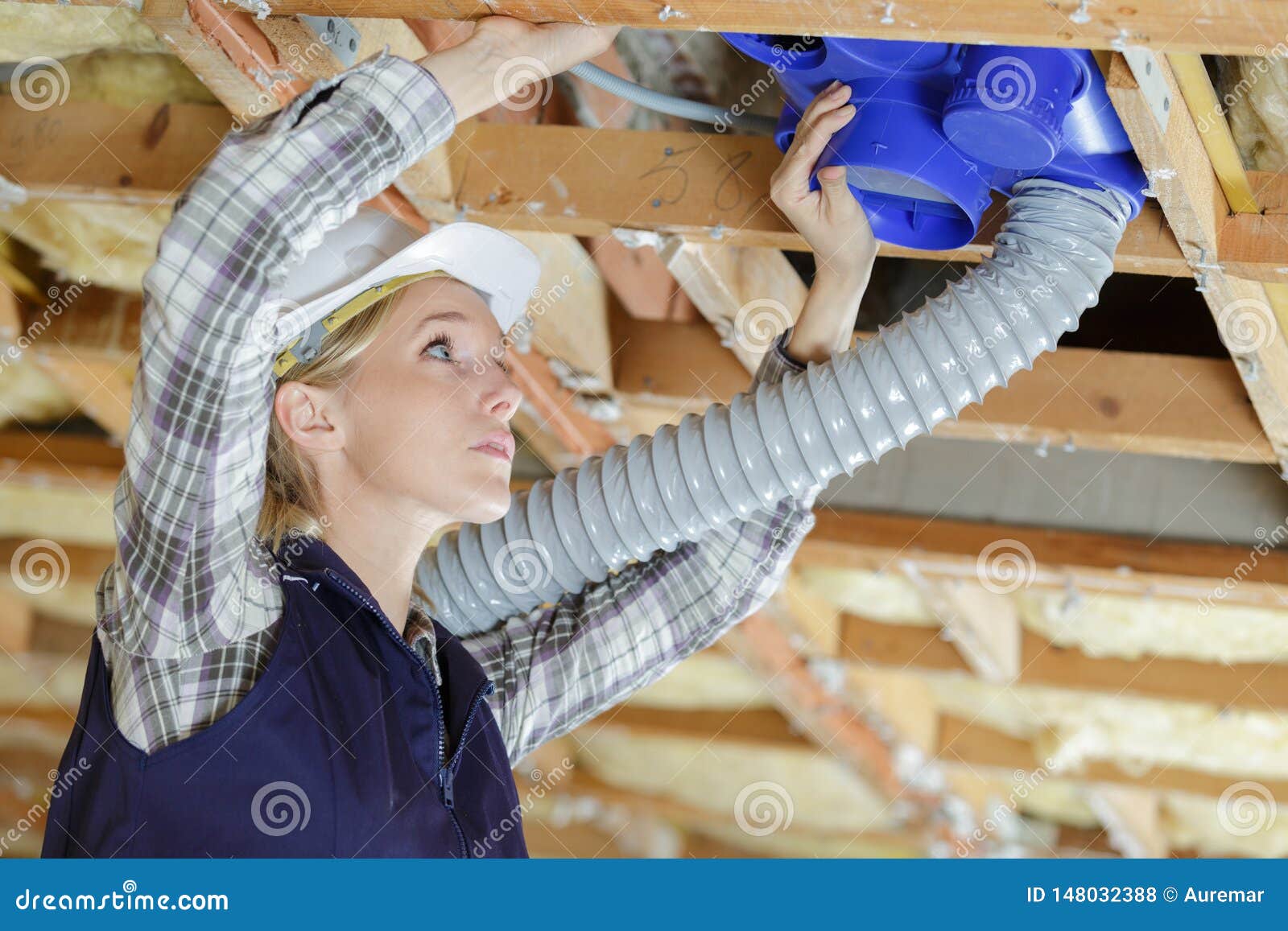 Young Lady Installing Air Conditioning Unit Stock Photo - Image of ...