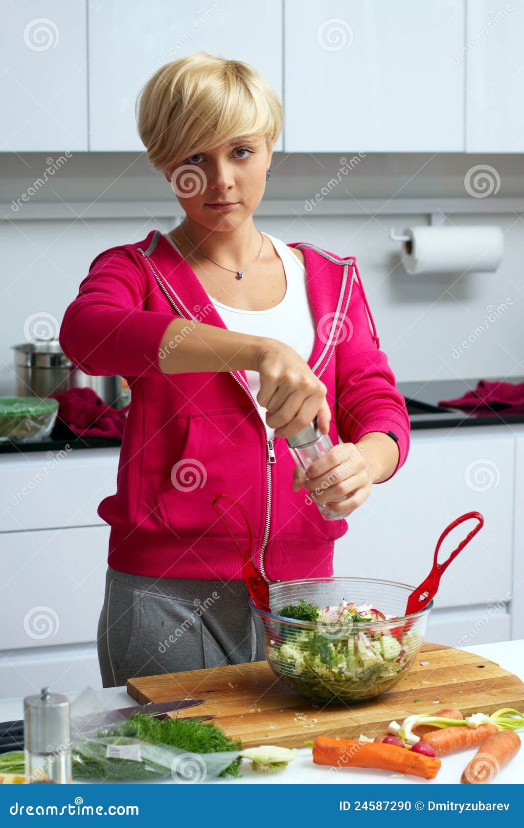 Young Lady Making Salad in Kitchen Stock Photo - Image of happy, girl ...